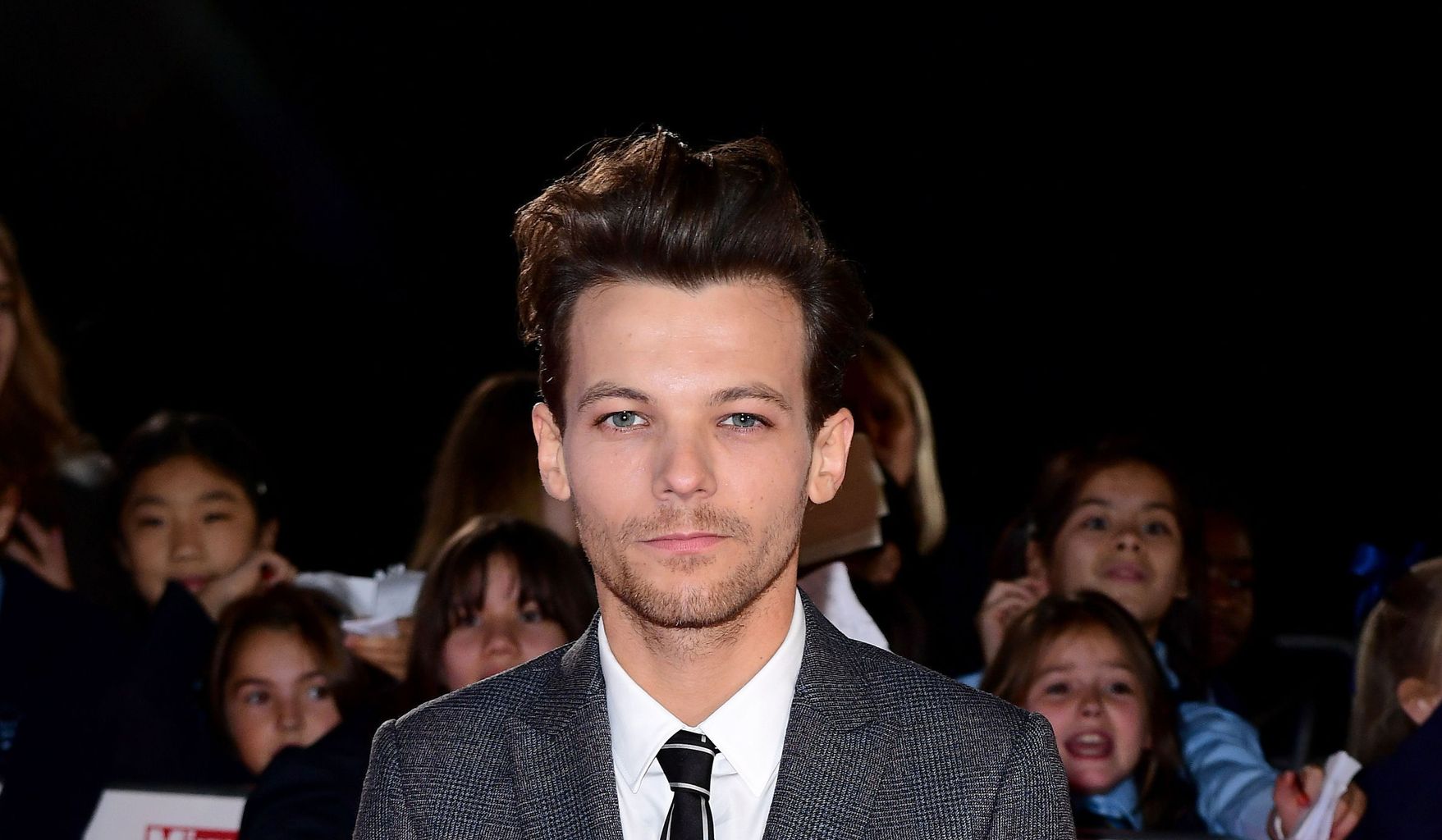 Louis Tomlinson reveals the One Direction member he'd trust to babysit ...