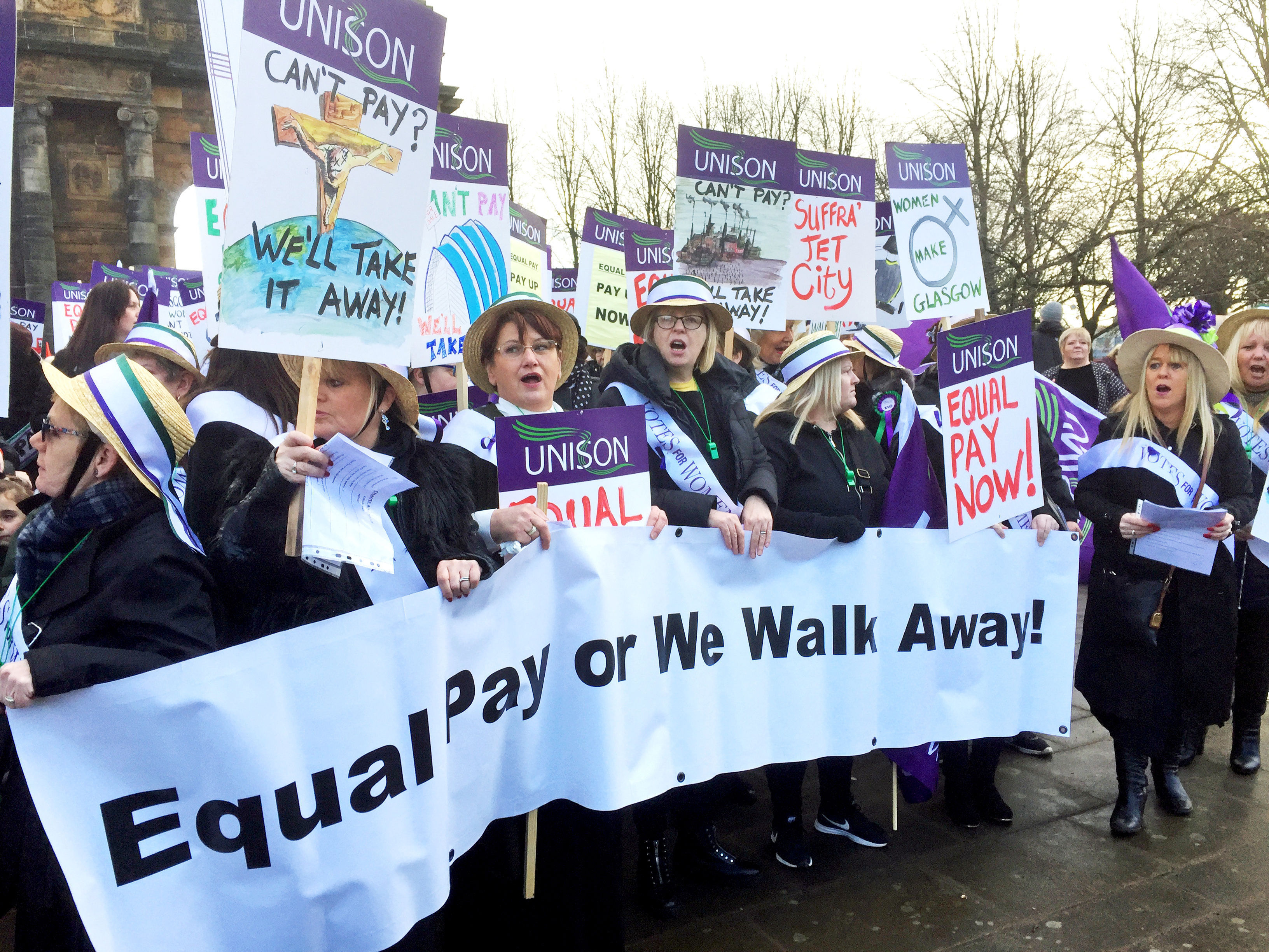 Female Council workers march for equal pay dressed as suffragettes ...