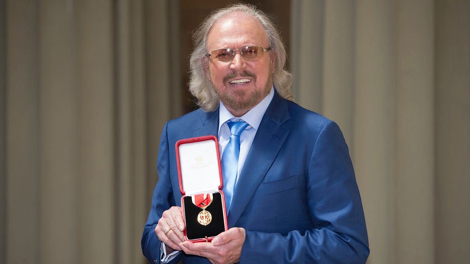 Barry Gibb gives moving tribute to late brothers as he receives knighthood