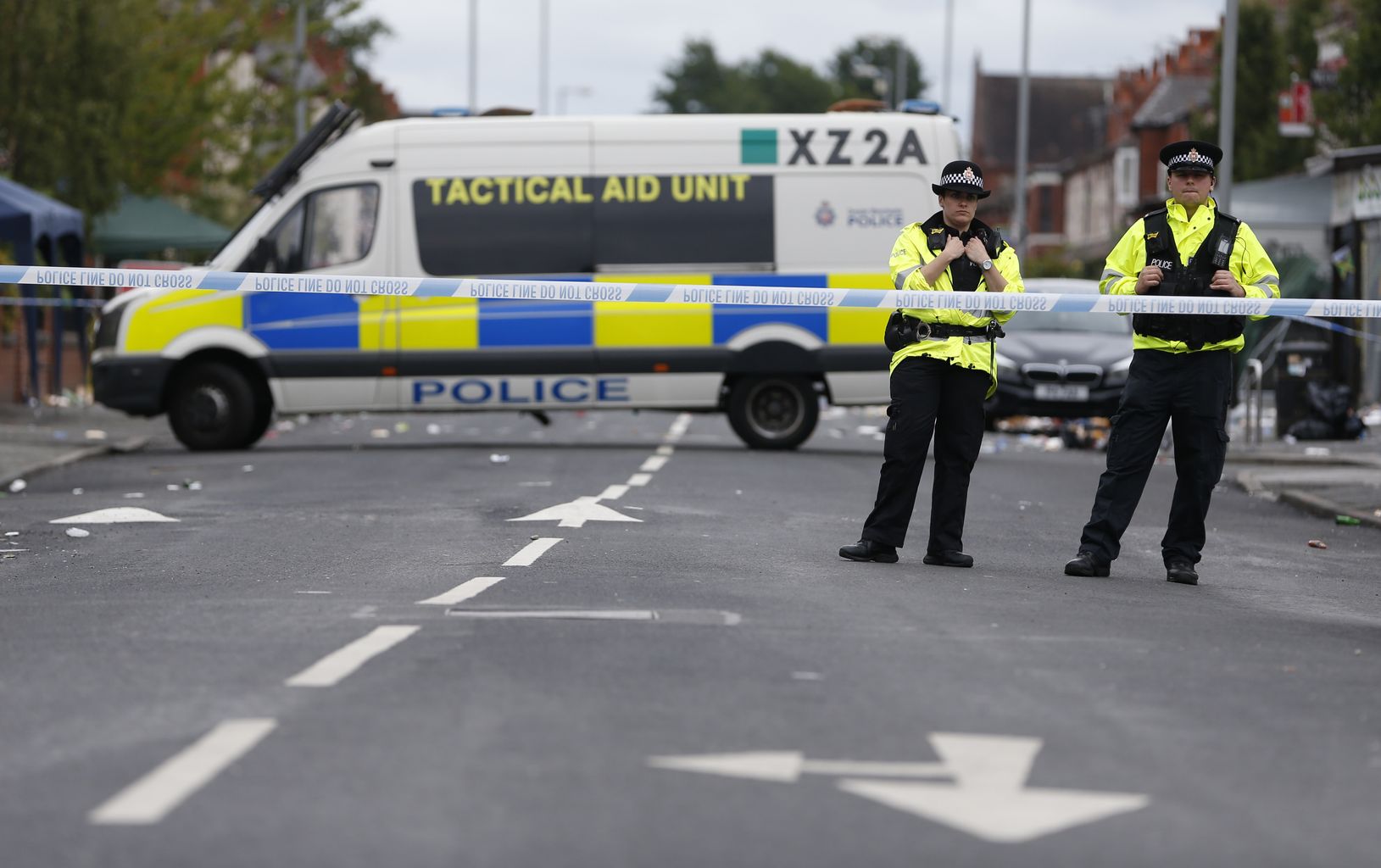 Two men arrested after 12 people injured in Moss Side shooting | News ...