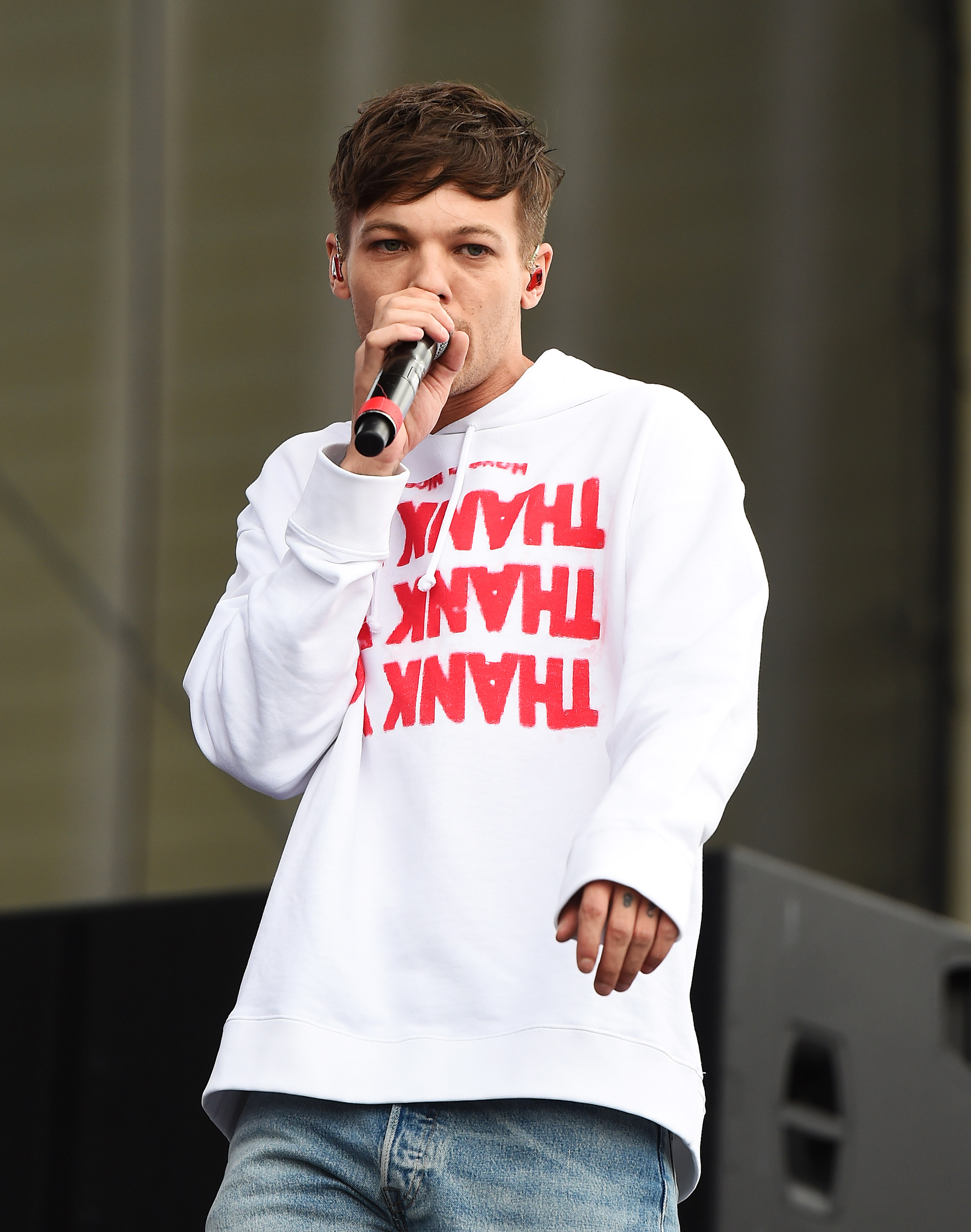 One Direction fans think Louis Tomlinson could be about to collaborate ...