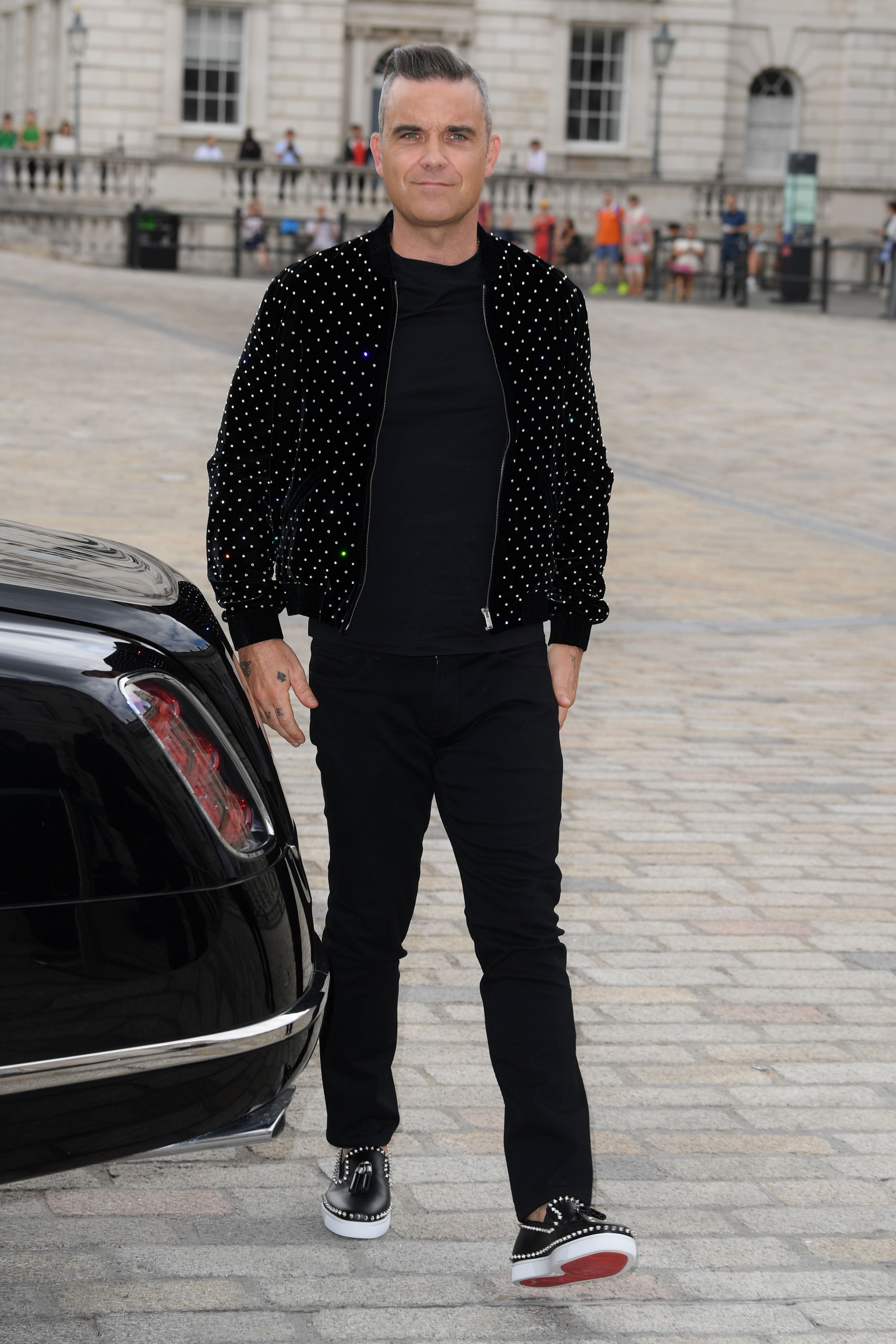 Robbie Williams just broke a MAJOR RULE at the Royal Wedding ...