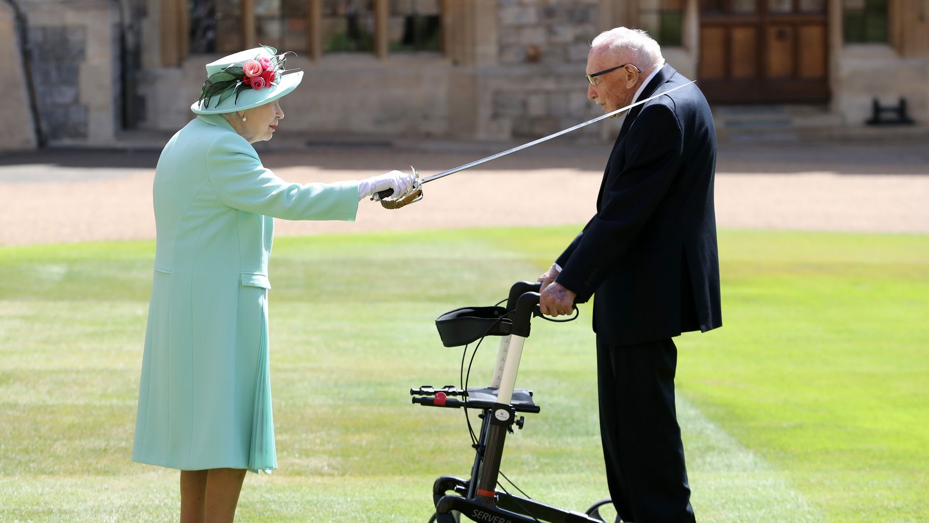 Captain Sir Tom Moore knighted by the Queen at Windsor Castle