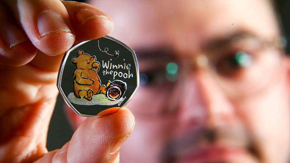 The first in a series of Winnie-the-Pooh 50p coins has been released