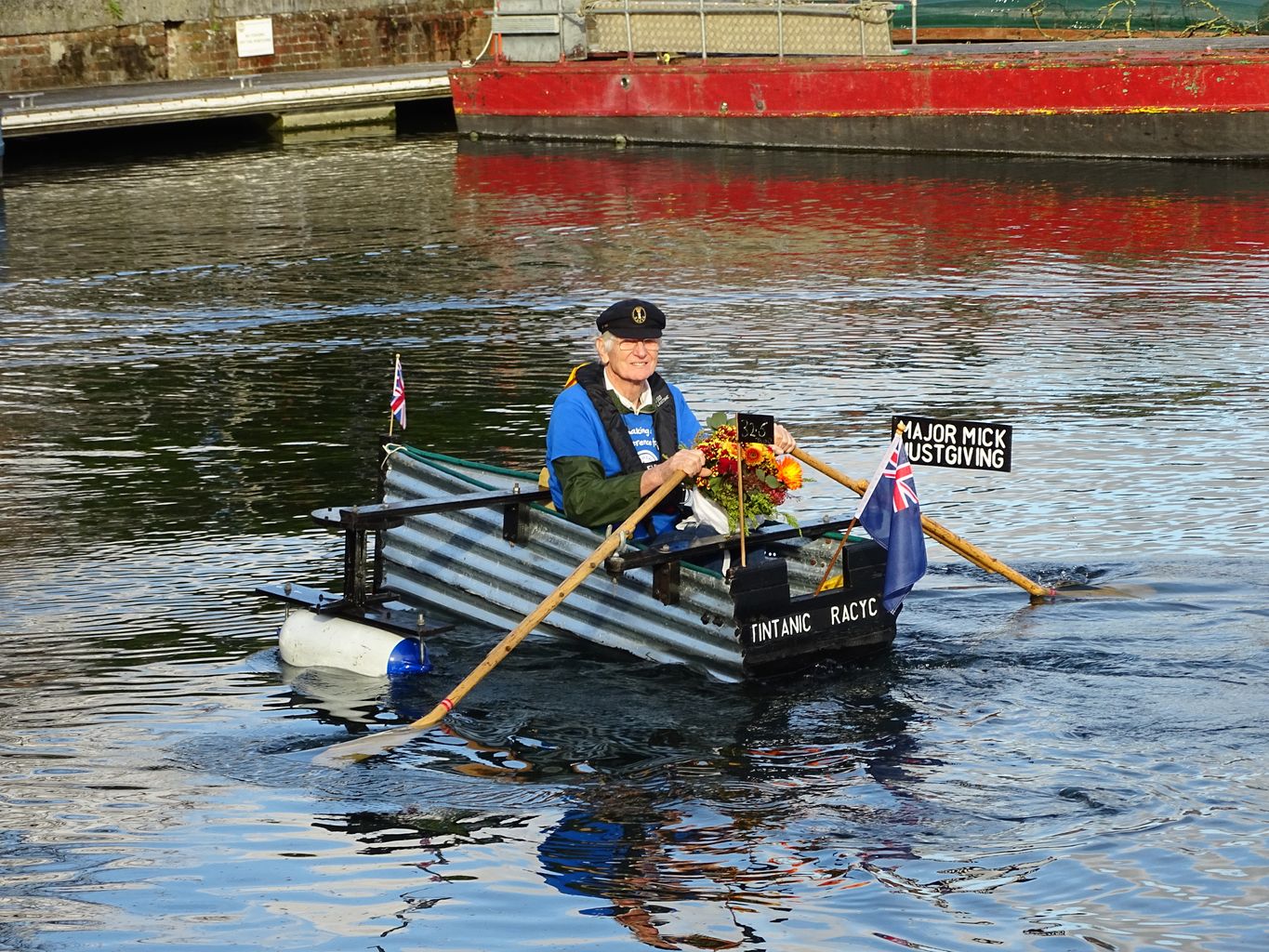 Man rowing homemade boat for charity marks 50 years of marriage with ...