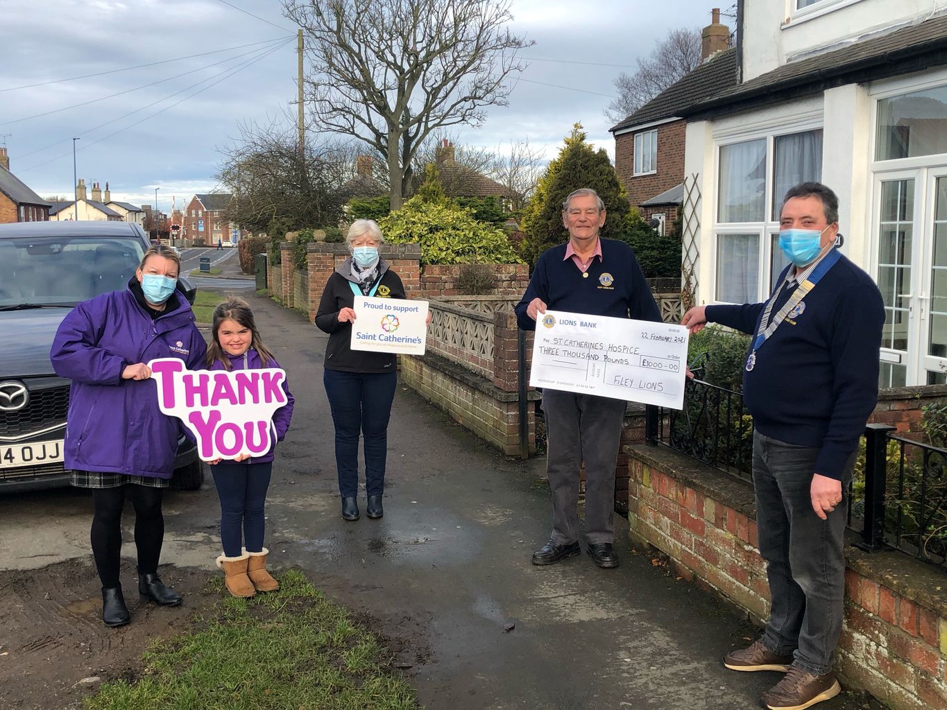 Filey Lions present £3,000 donation to Saint Catherine's