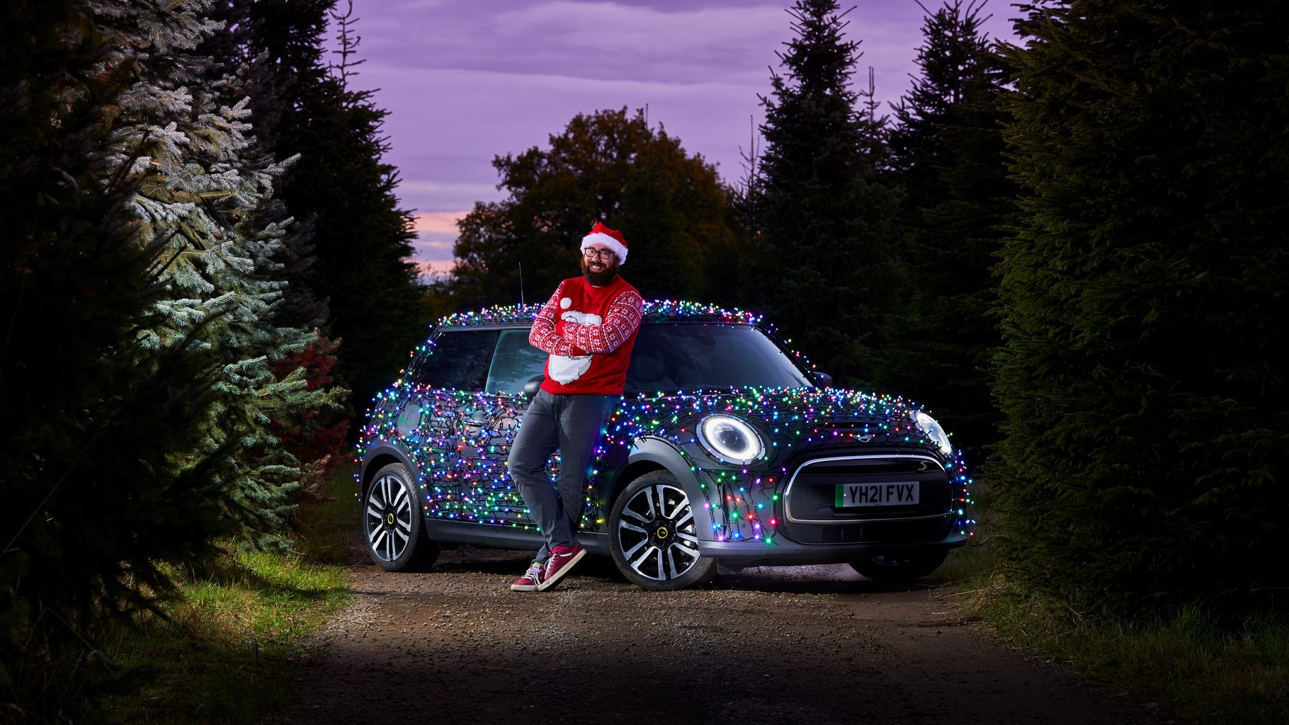 Christmas light-wrapped car touring around the UK for charity