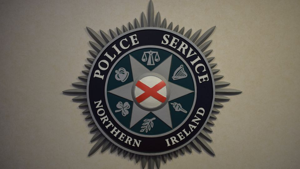 Two police officers injured after car drives into PSNI vehicle ...