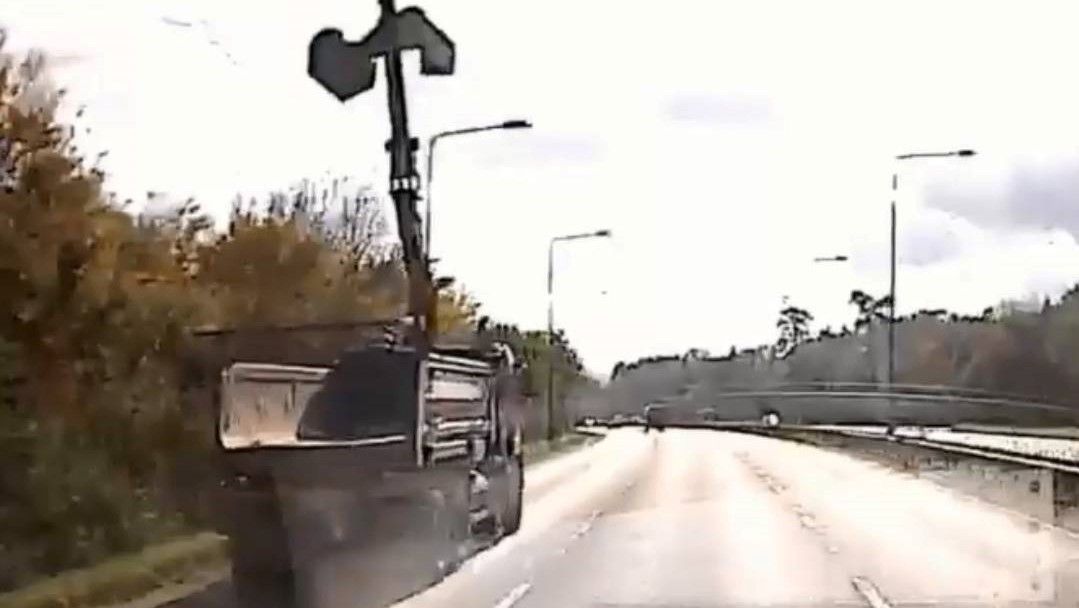 Lorry driver convicted after A23 bridge collision