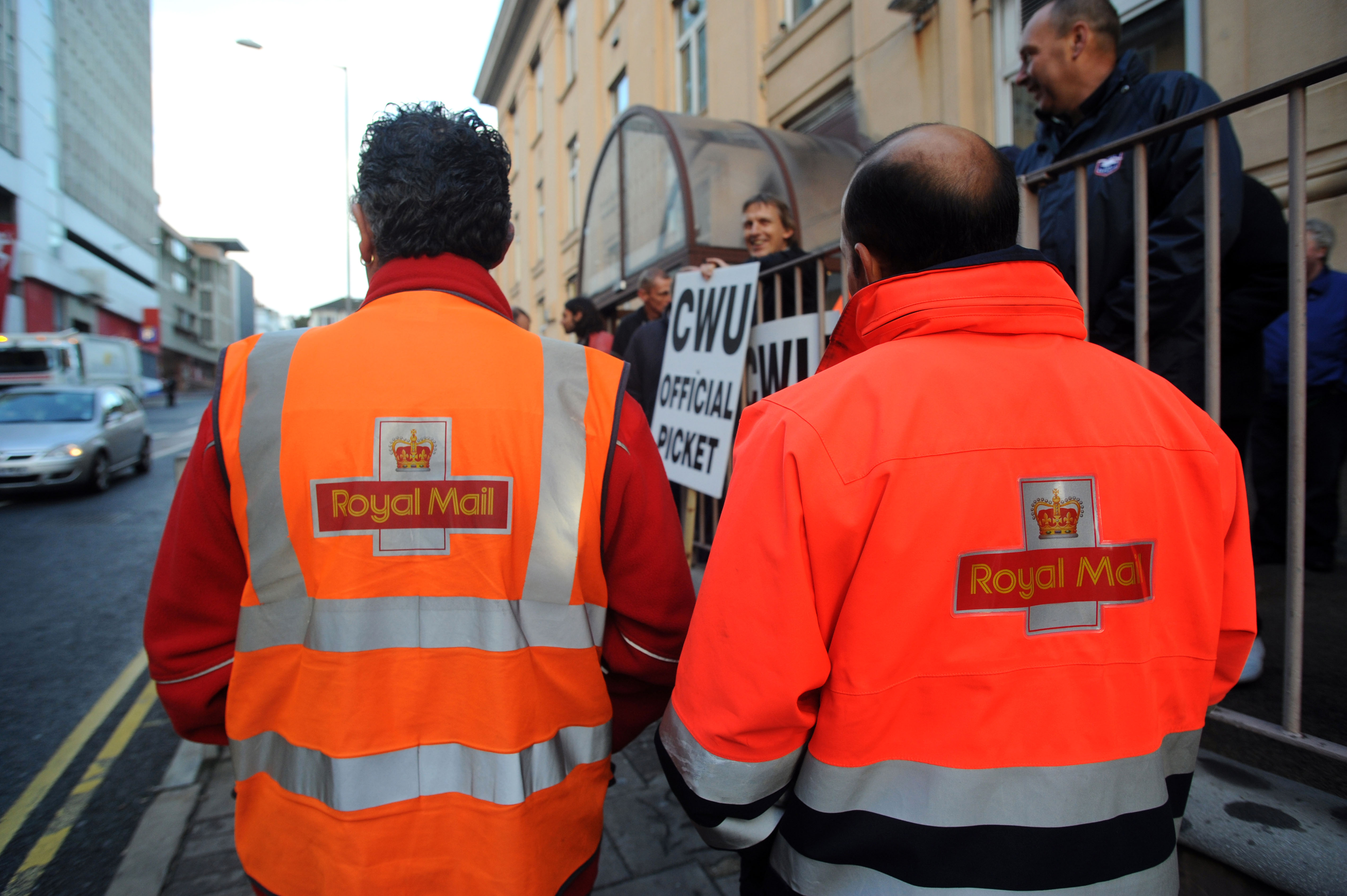 115,000 postal workers walk out in 'biggest strike since 2009' | News ...