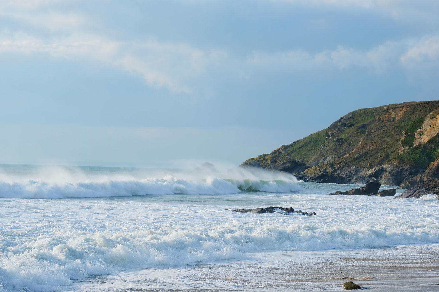 Two lives saved after rip current sweeps bodyboarders towards rocks in ...