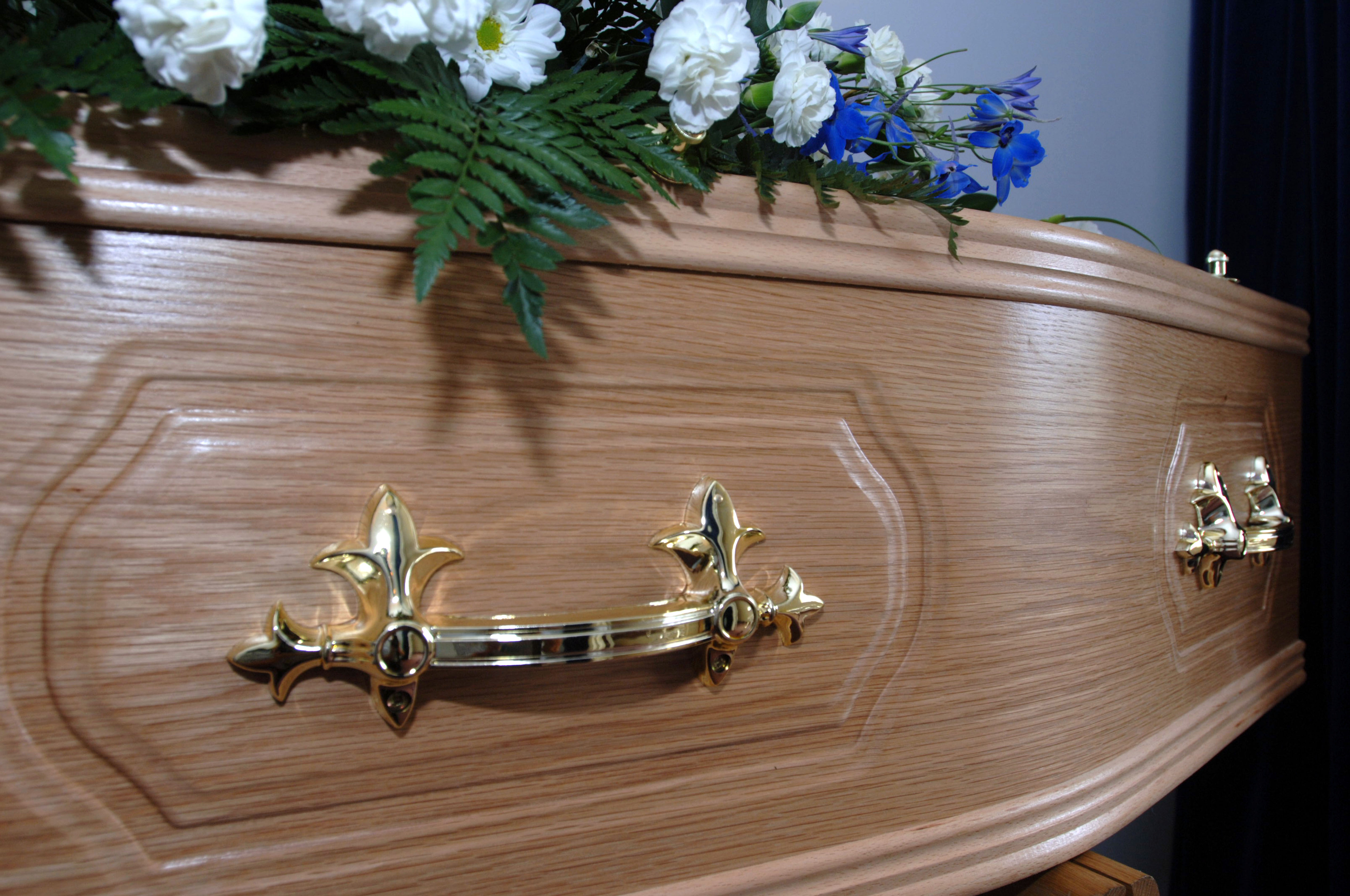 Coffin makers in Glasgow to walk out in pay row | News - Clyde 1