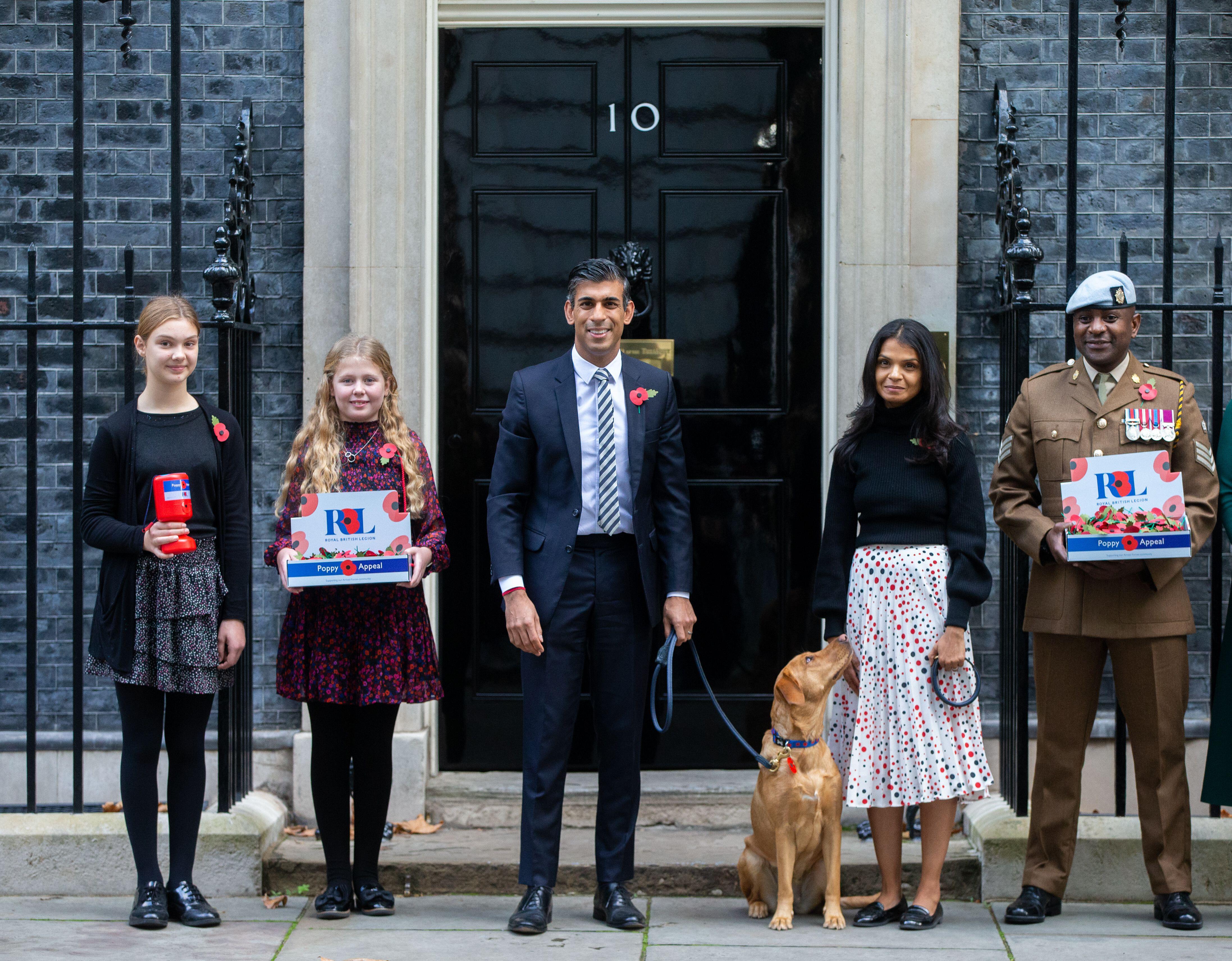 The Prime Minister sells poppies | News - Greatest Hits Radio (London)