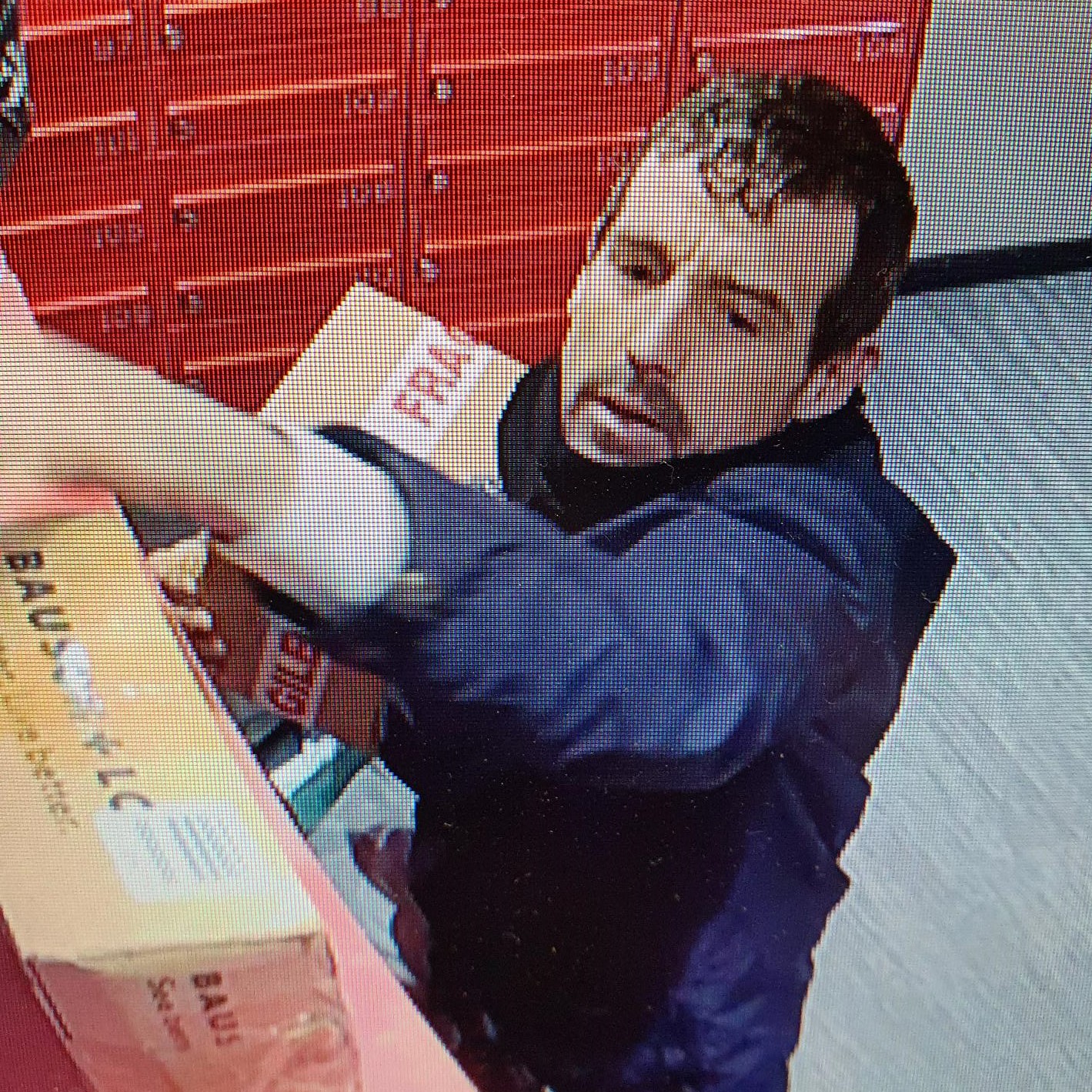Police release CCTV of man alleged to have stolen parcels in Stockport