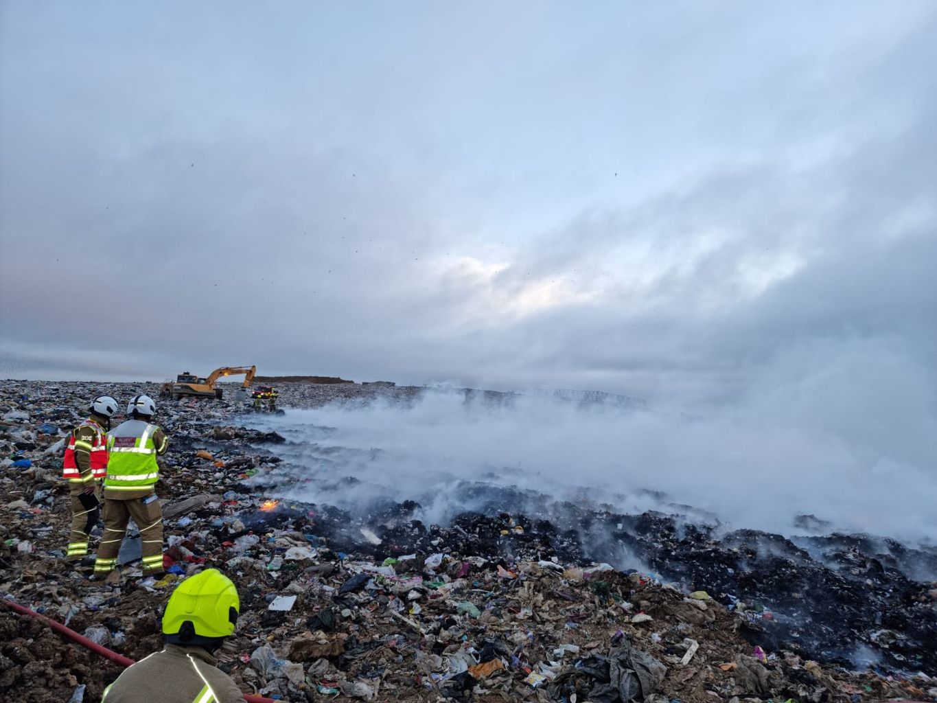 Fire crews tackle large fire at a landfill site in Stanway