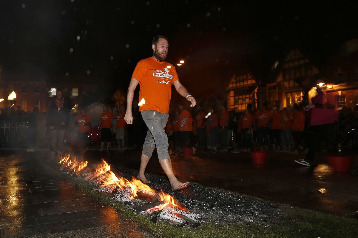 Fire and glass walk raises thousands for Salisbury Hospice