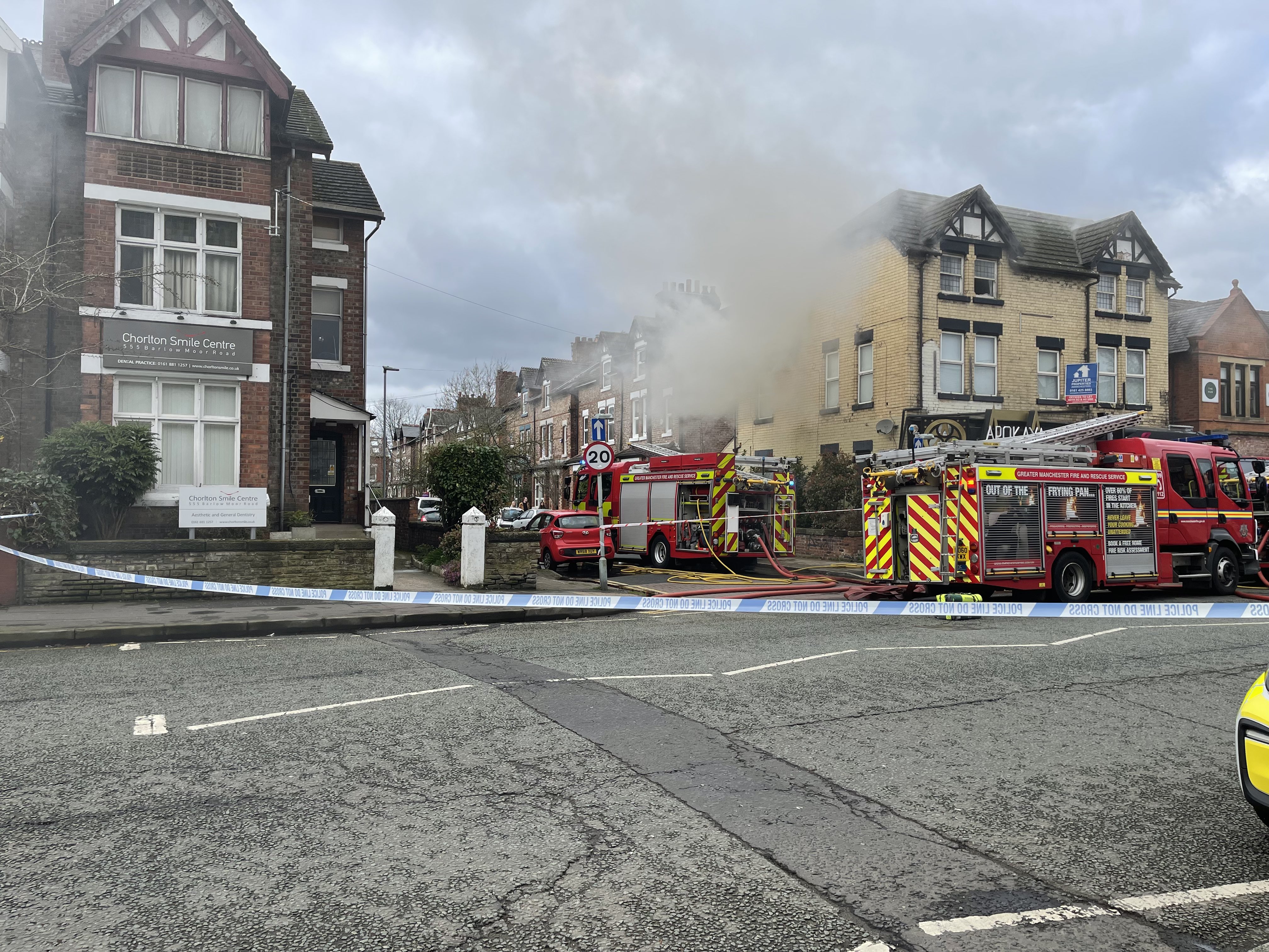 Emergency services on the scene of a fire in Chorlton