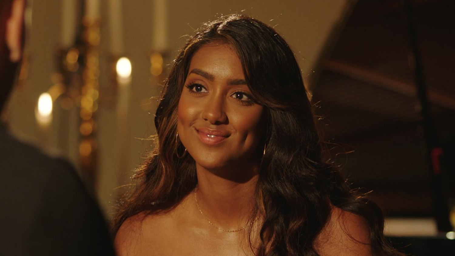 What was Sanam's job before Love Island?