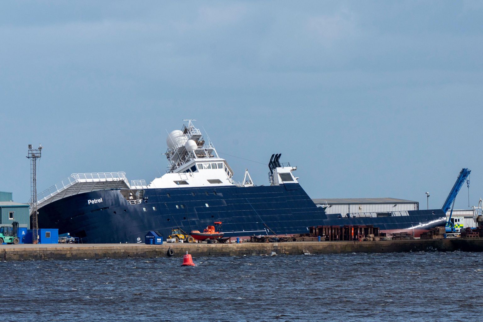 Specialist cranes brought in to Leith dry dock where ship toppled over