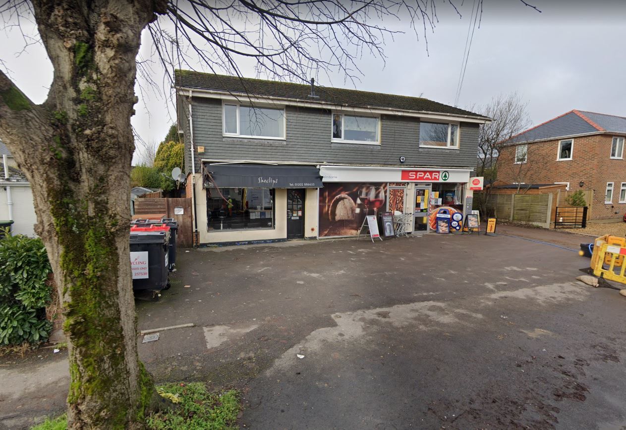 Shop worker threatened with a knife during a robbery in Wimborne