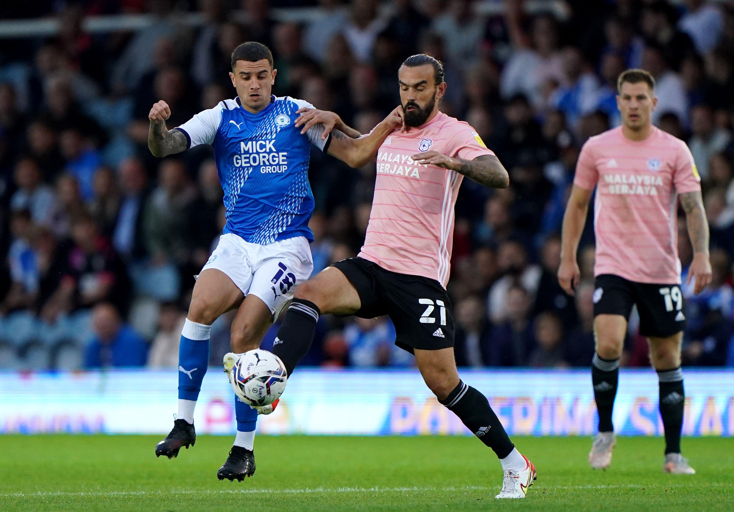 Peterborough's mid fielder Ollie Norburn is joining Blackpool.