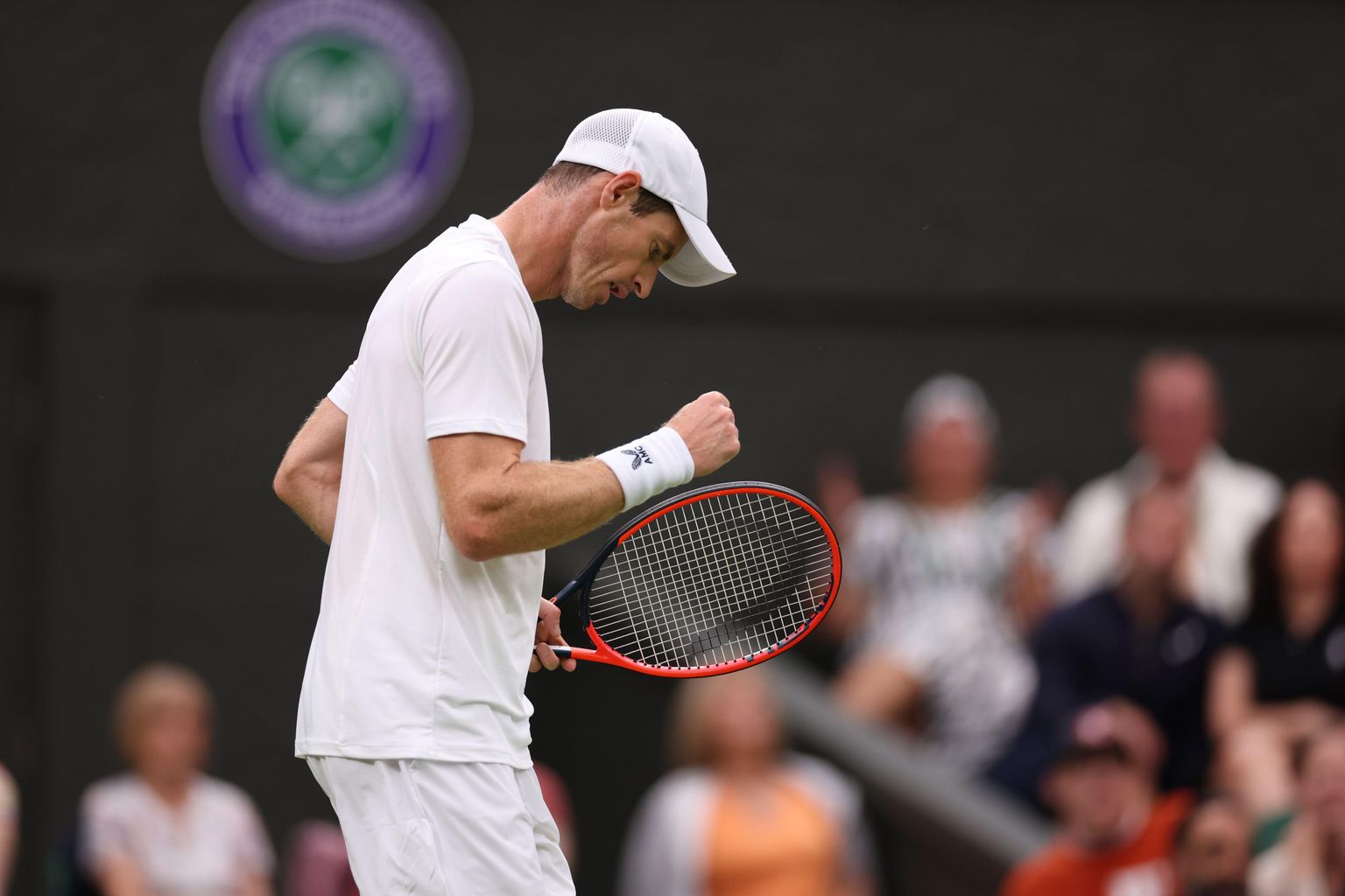 Andy Murray eases through first round match at Wimbledon Andy Murray eases through first round match at Wimbledon