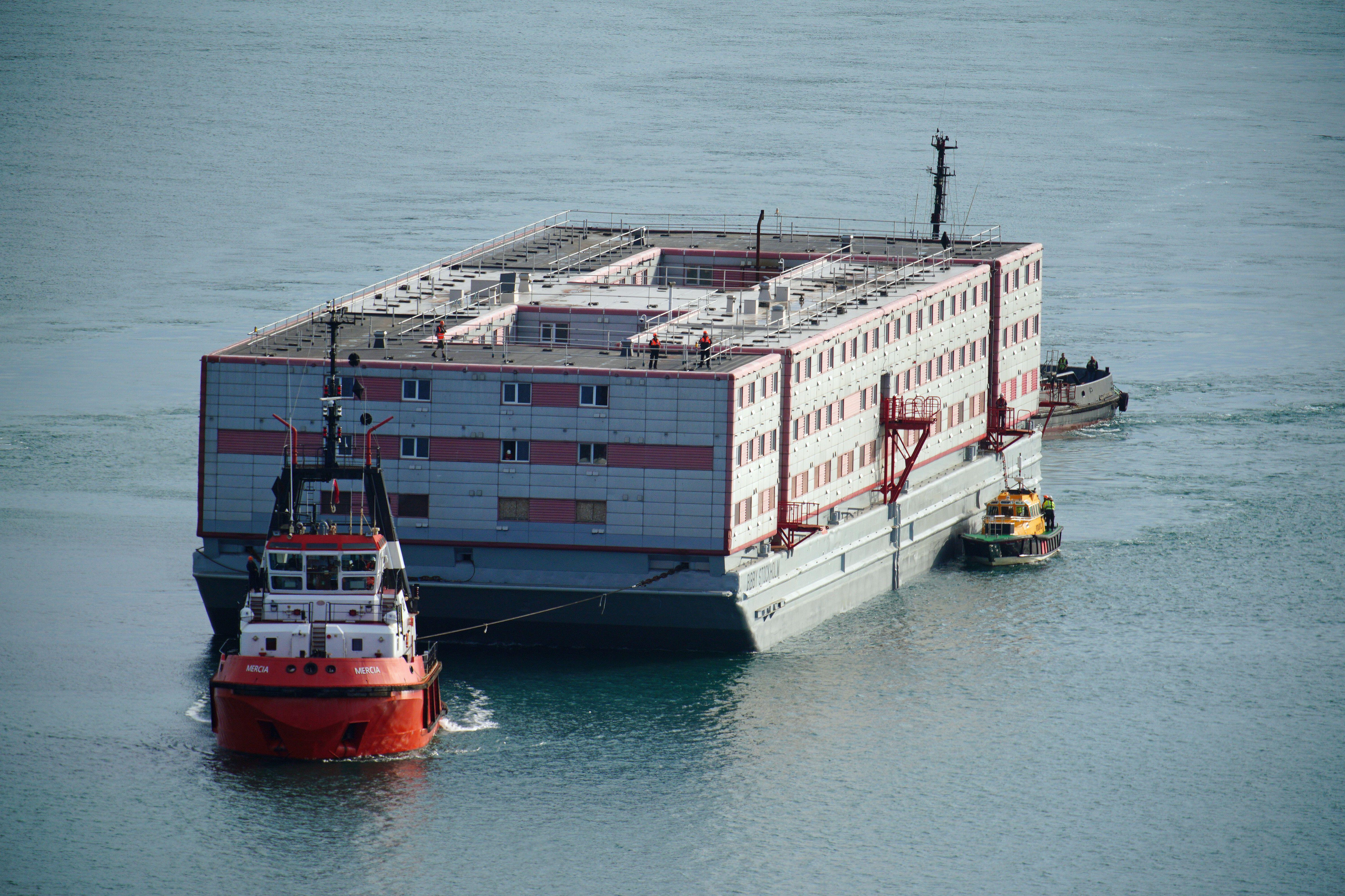 Barge which will house asylum seekers docks in Dorset