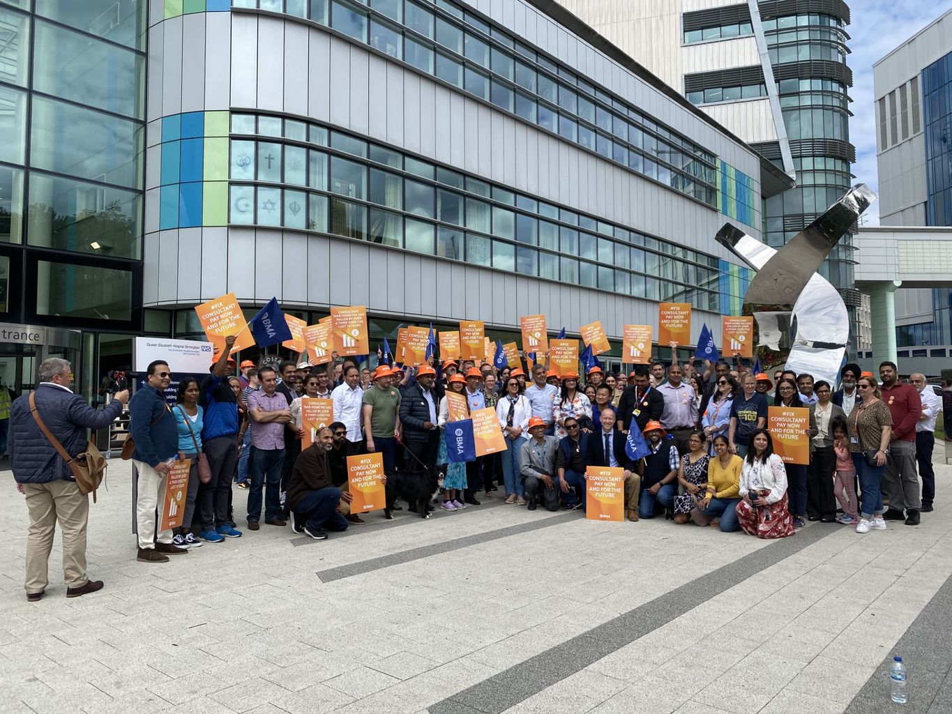 More than 100 NHS consultants joined at the QE Hospital to picket for ...