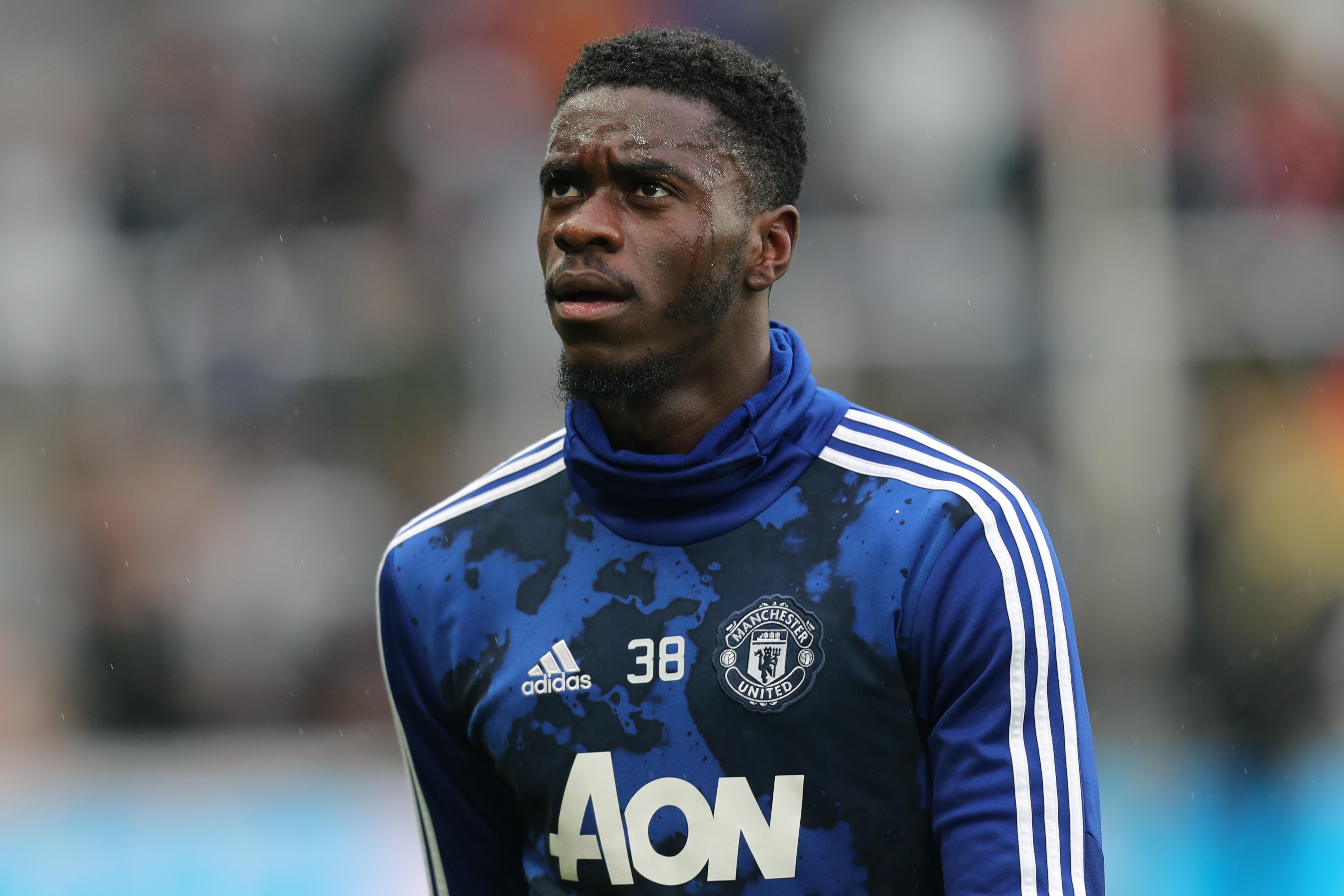Ipswich Town sign former Manchester United defender Axel Tuanzebe ...