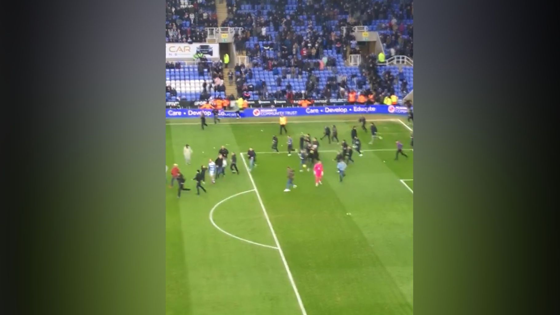 Reading's game with Port Vale abandoned after fans invade pitch in ...
