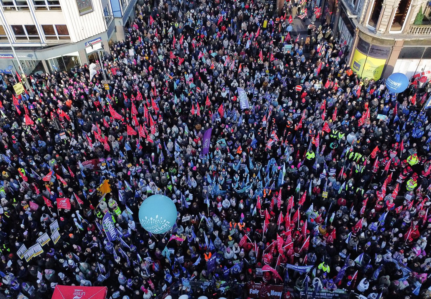 Thousands take to streets to back mass public sector strike in Northern ...