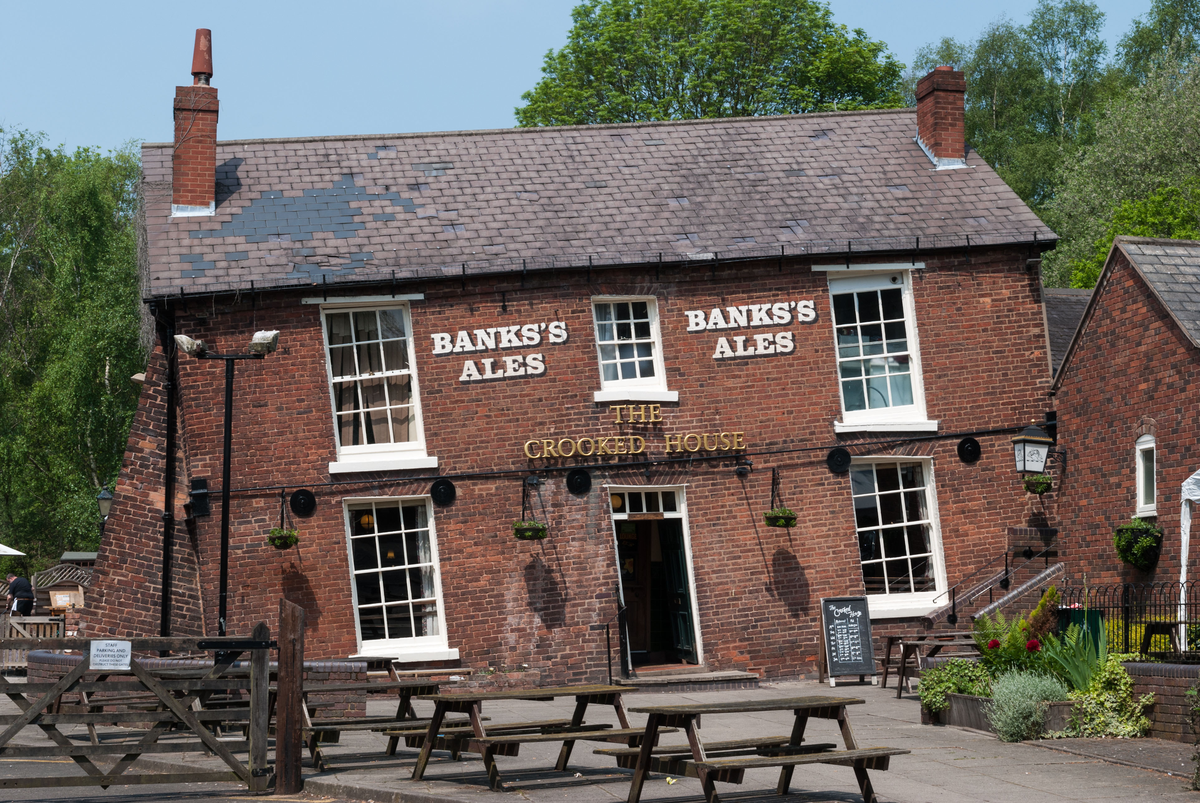 Owners of Crooked House pub ordered to rebuild it following fire
