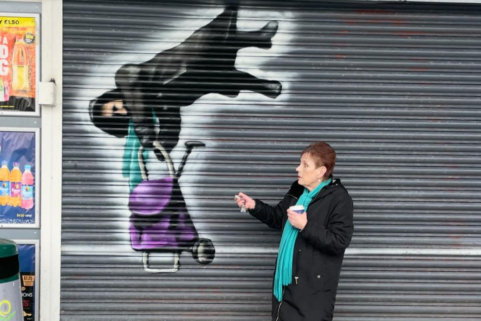 Artist's tribute to woman caught in shutter after video goes viral ...