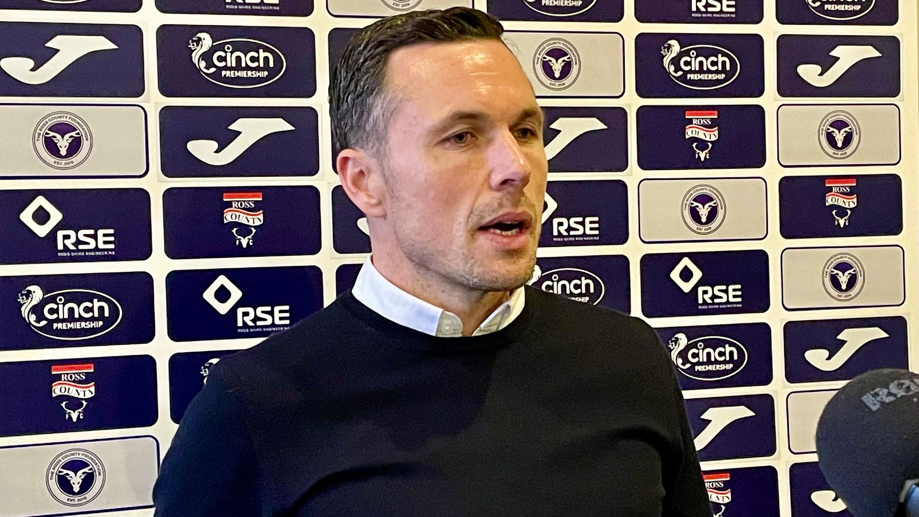 Ross County boost battle against relegation with win over Hearts.