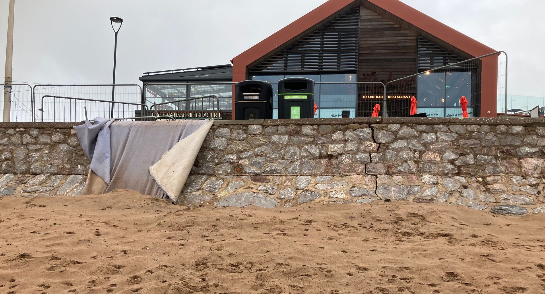 Work begins to help save a seafront wall, after parts collapsed | News ...