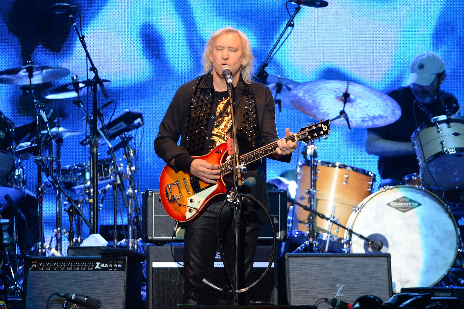 The Eagles’ Joe Walsh plays with music students at New Zealand site in ...