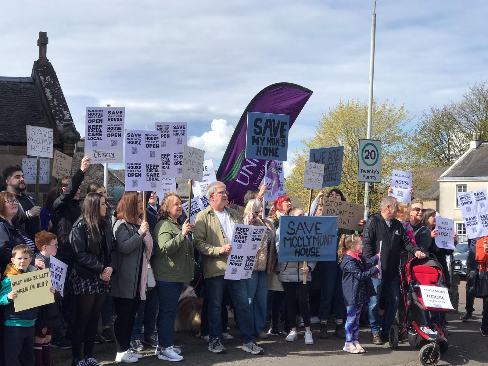 Campaigners march through Lanark urging council not to close care home
