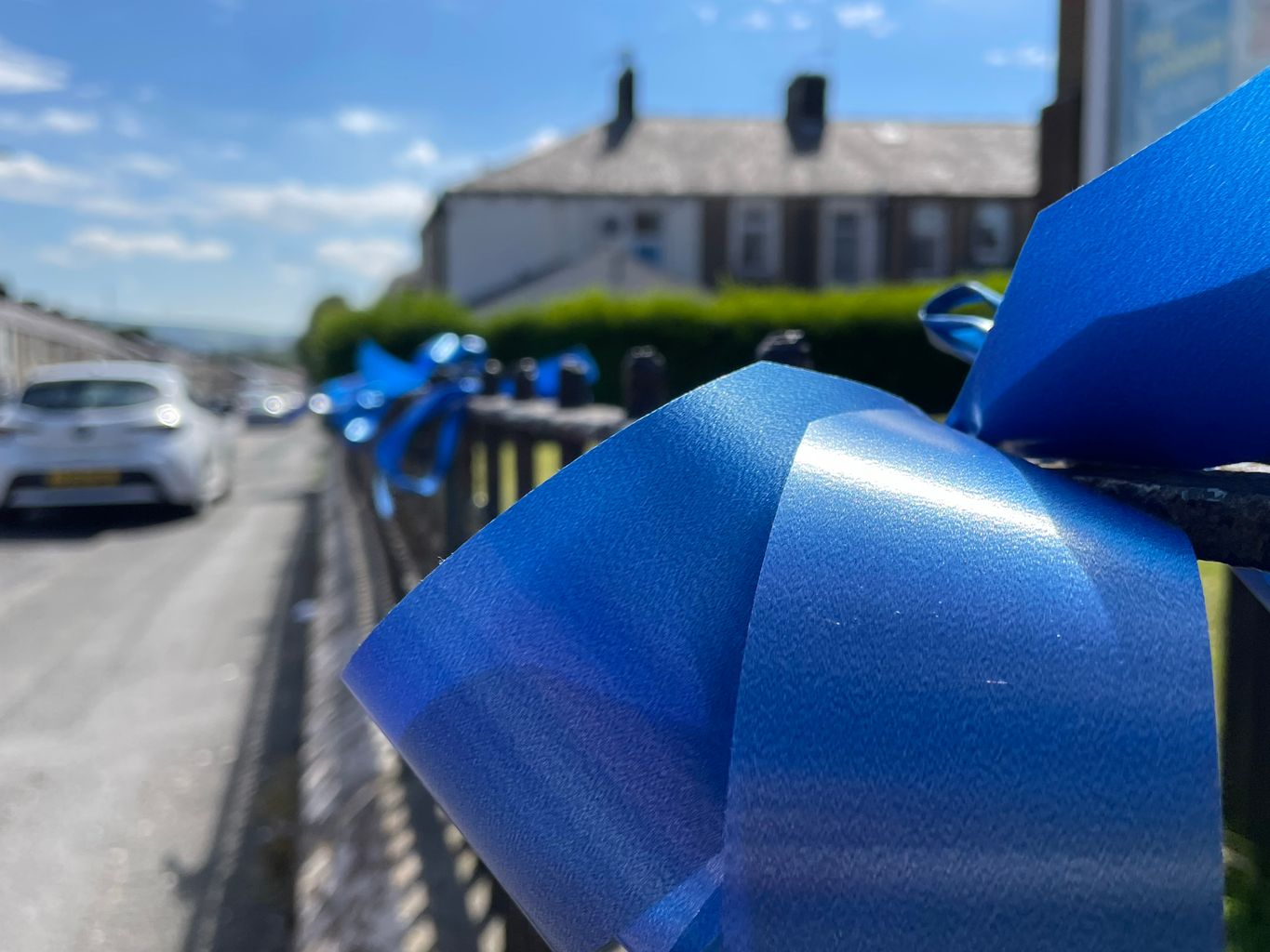 Prayers and blue ribbons for Jay Slater in Lancashire, as search continues