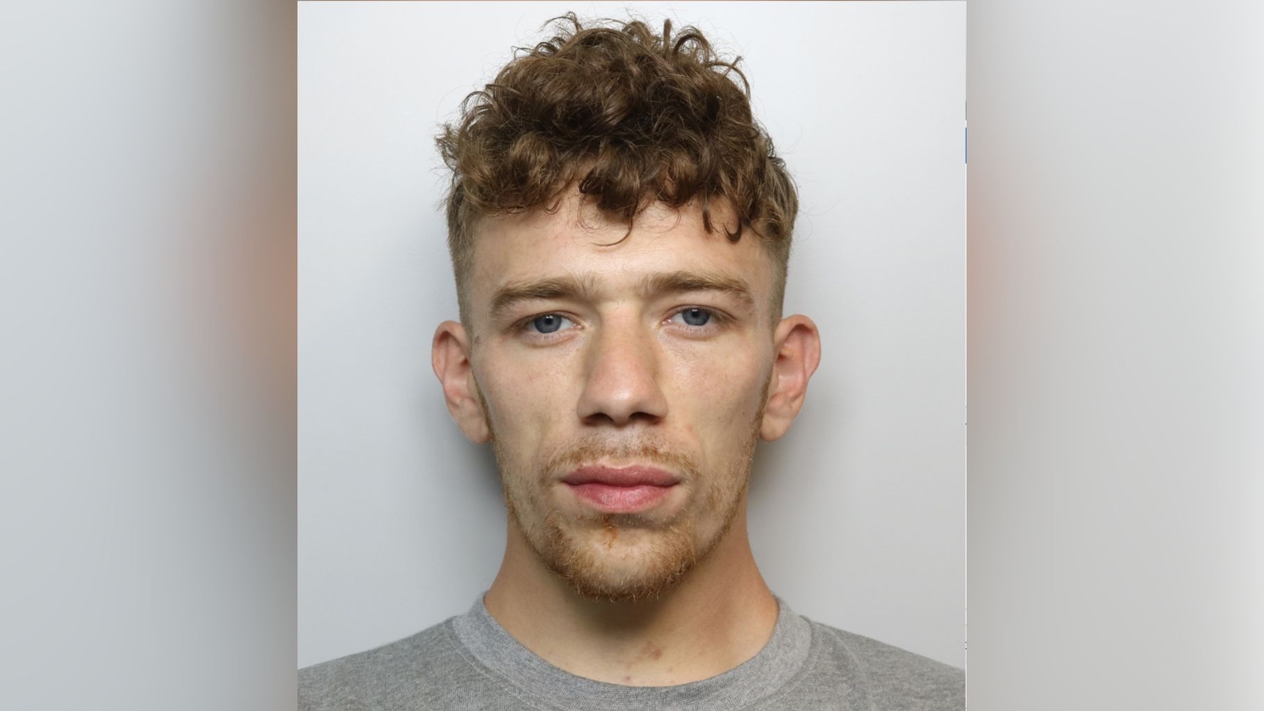 A man is wanted over two assaults on police in Oxford
