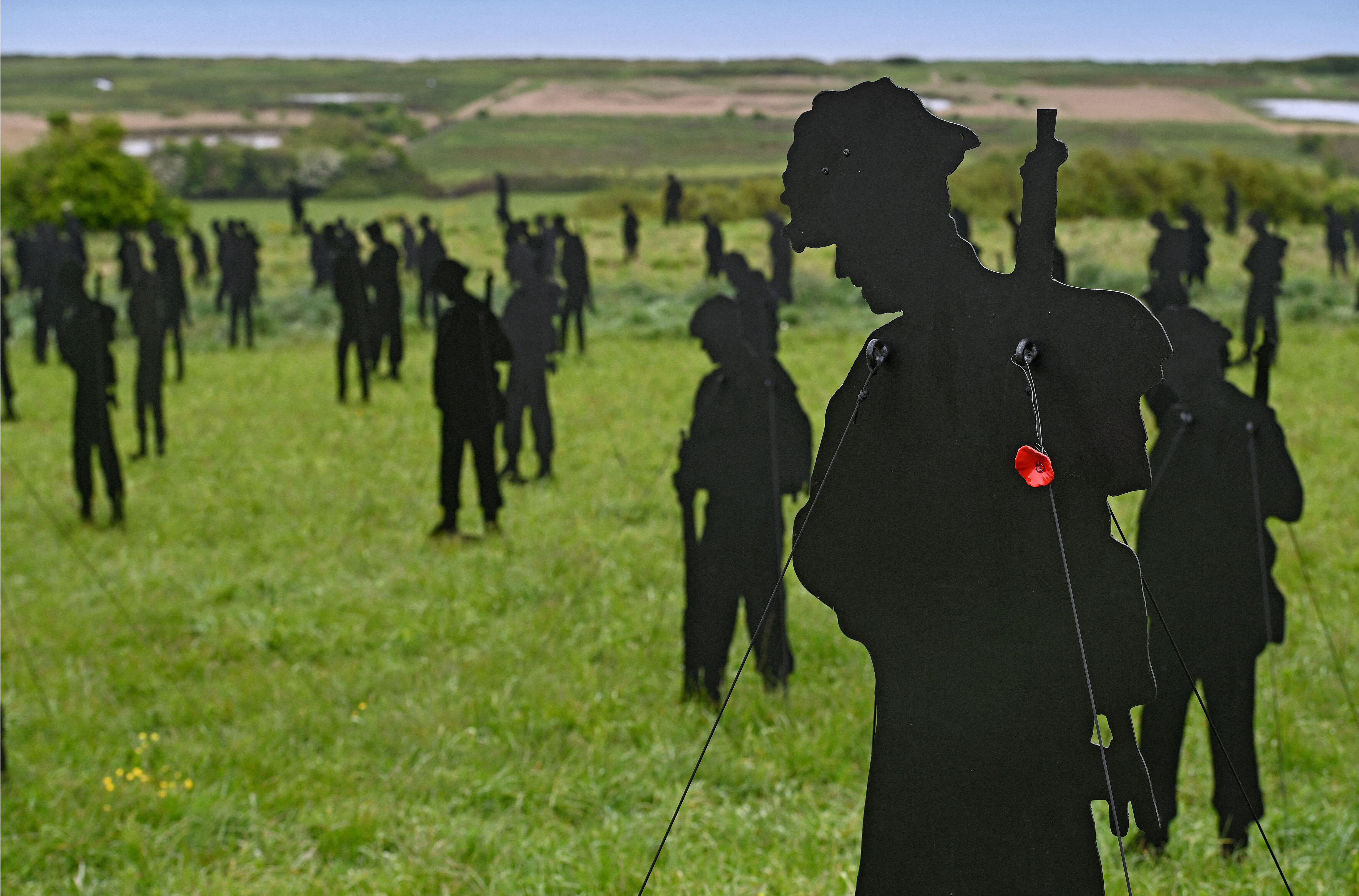 D-Day silhouette statues return to the UK from display in Normandy ...