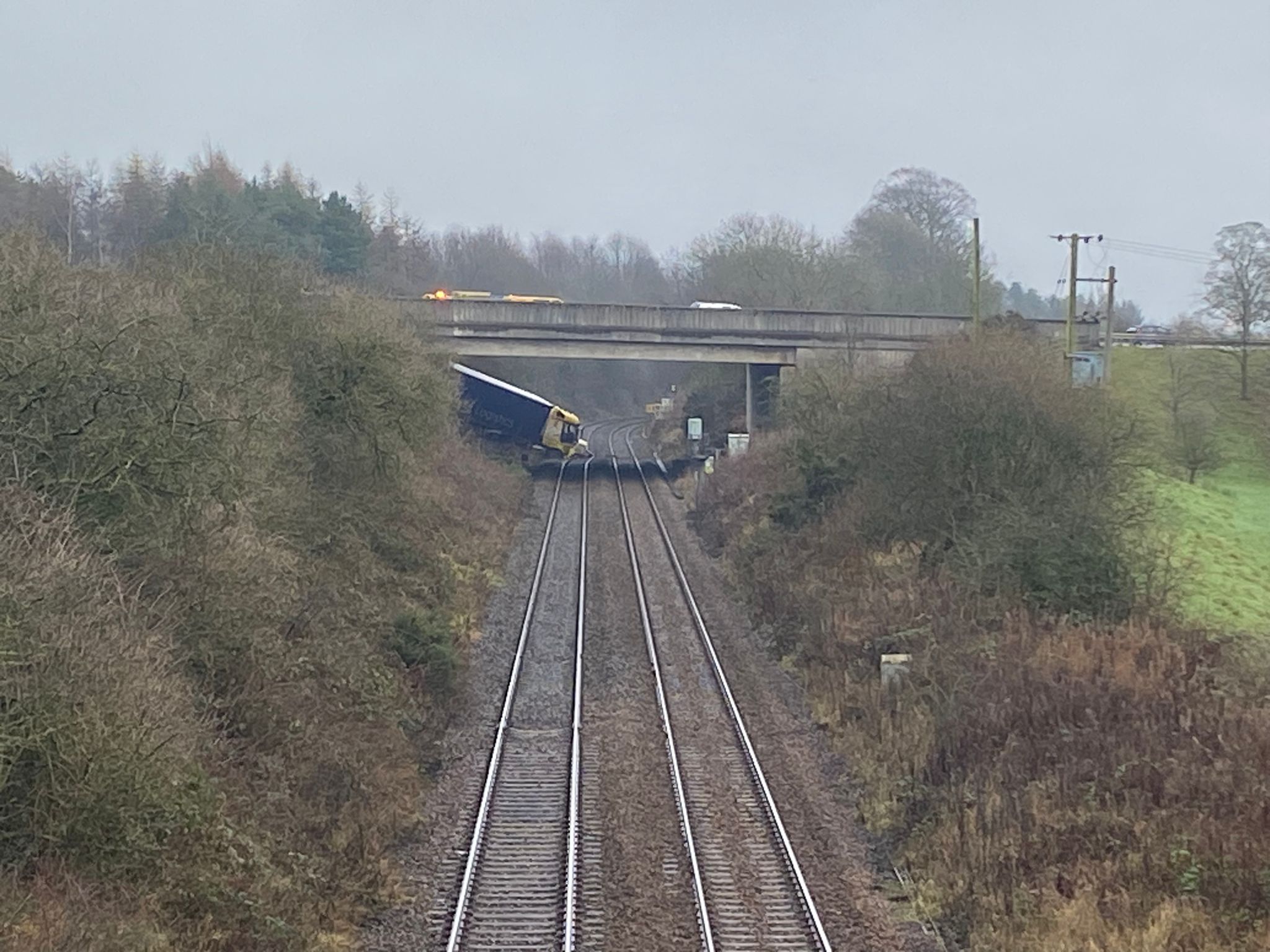 One person hospitalised after lorry crashes onto railway near Gretna
