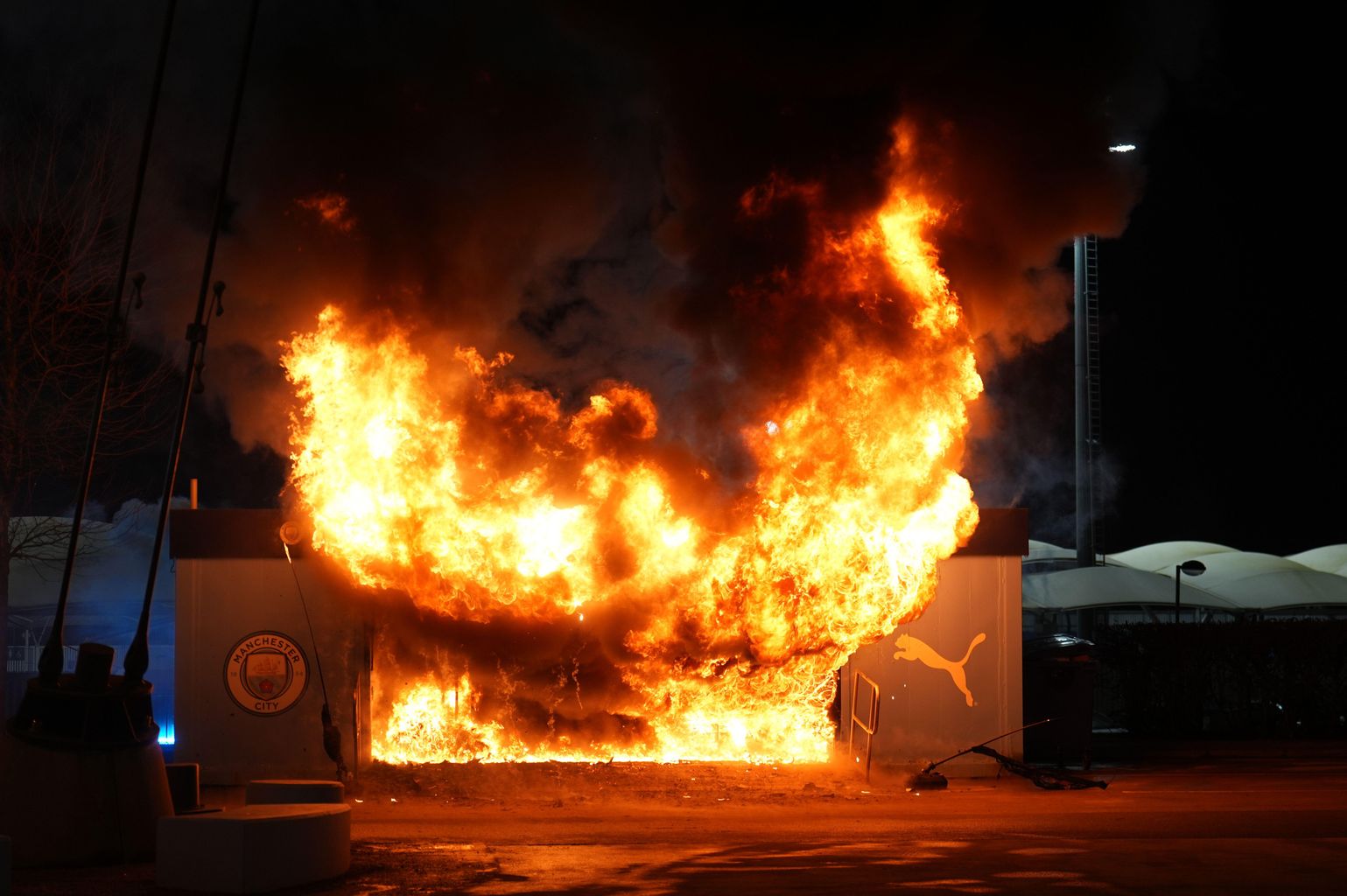Stunning pictures show kiosk fire outside Manchester City ground