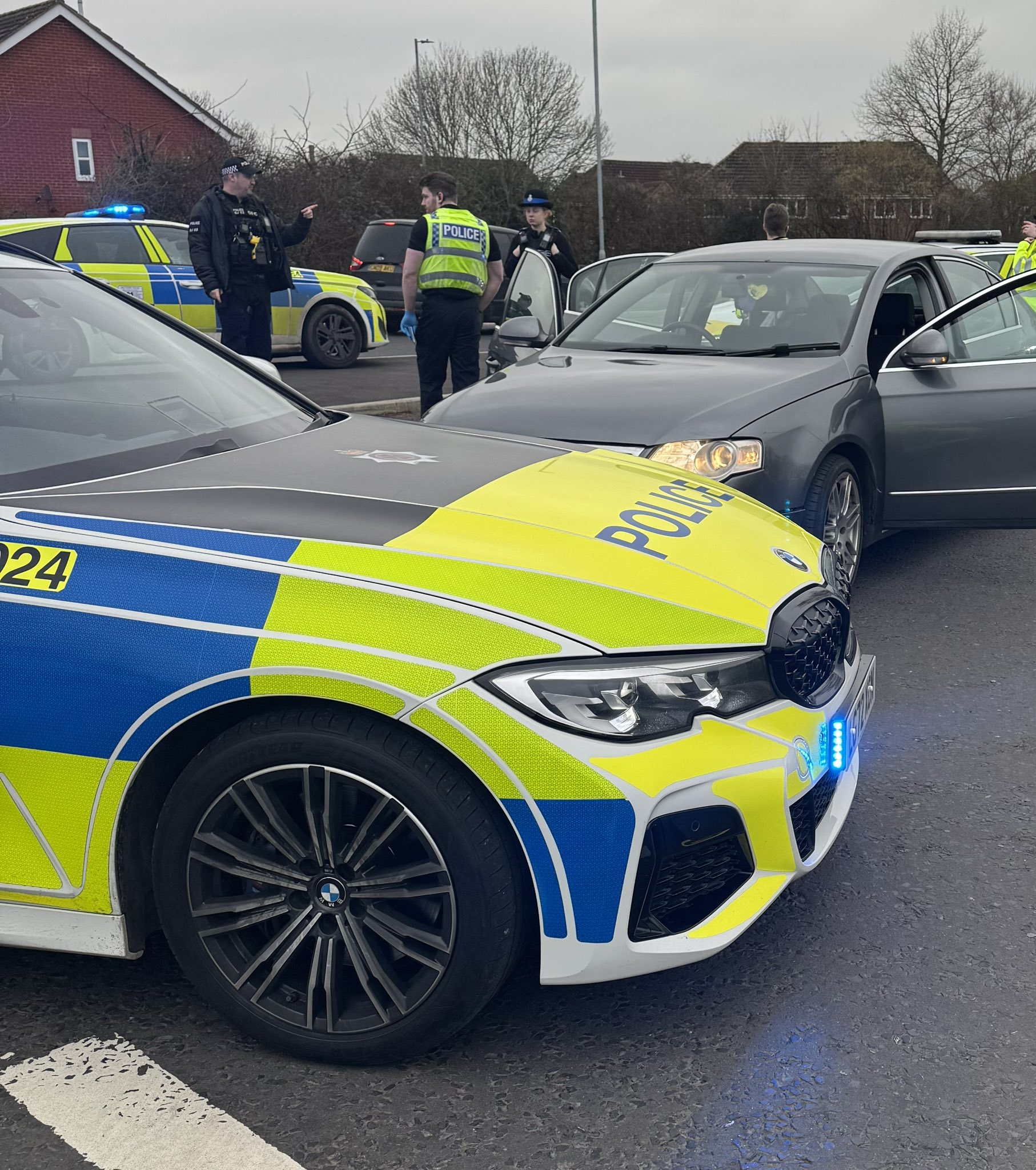 Four men charged over Warminster Boots theft