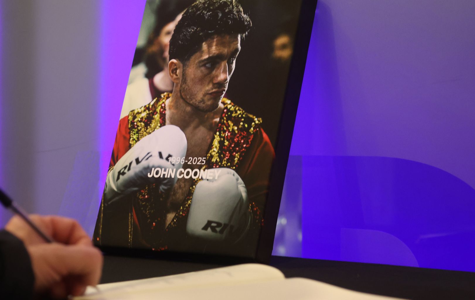 Hundreds attend funeral of boxer John Cooney