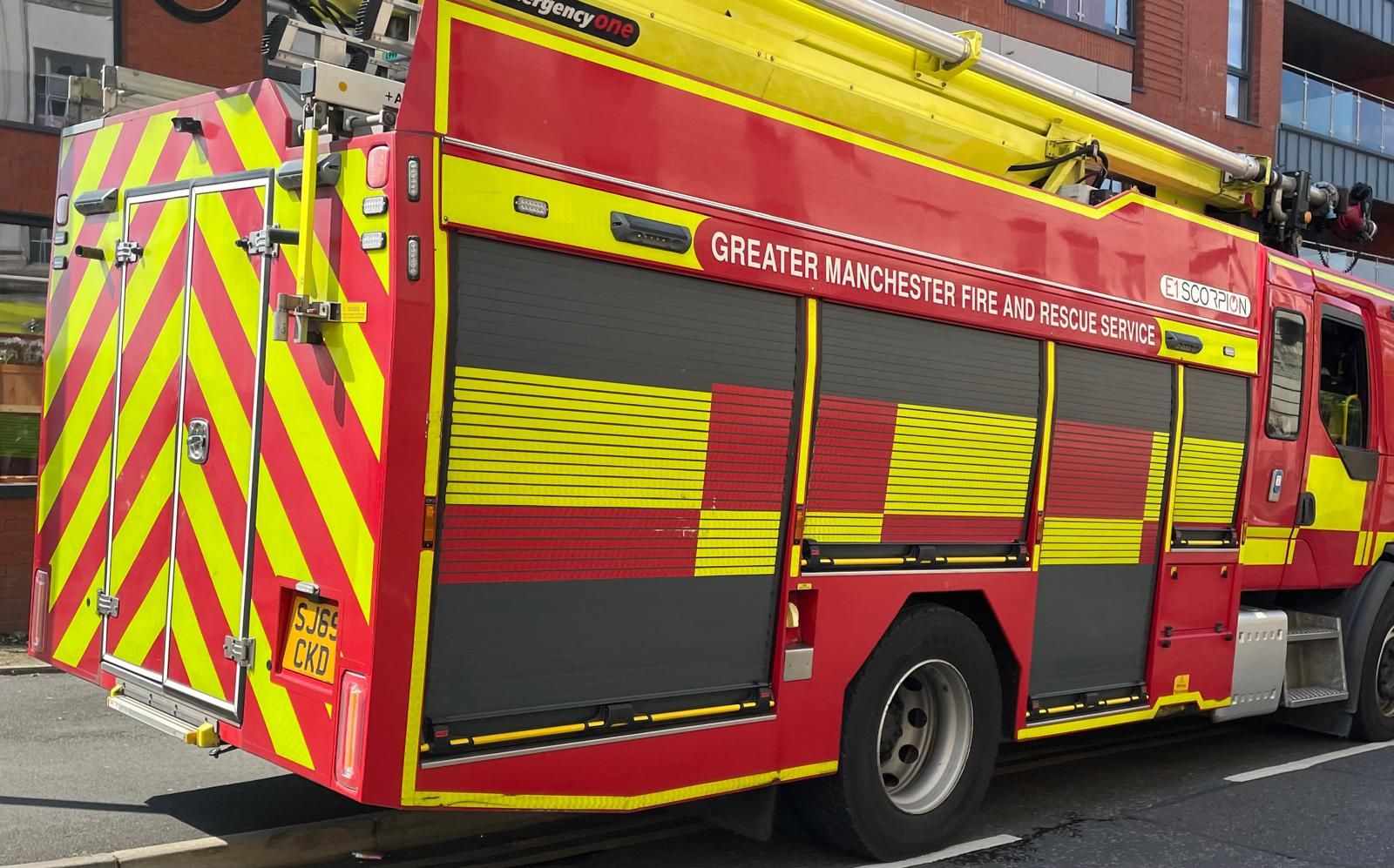 Body found in debris of flat fire in Oldham