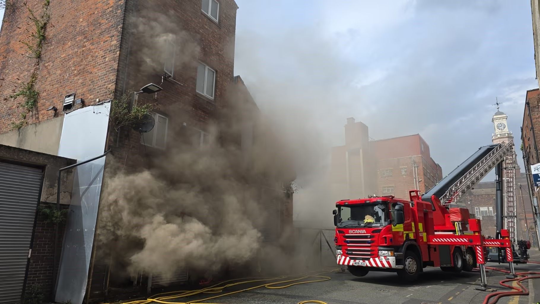 More crews called to ongoing building fire | News - Greatest Hits Radio ...