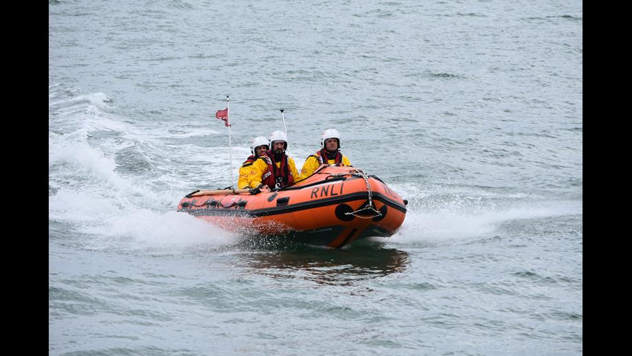 RNLI rescue man from inflatable boat off Seaford beach