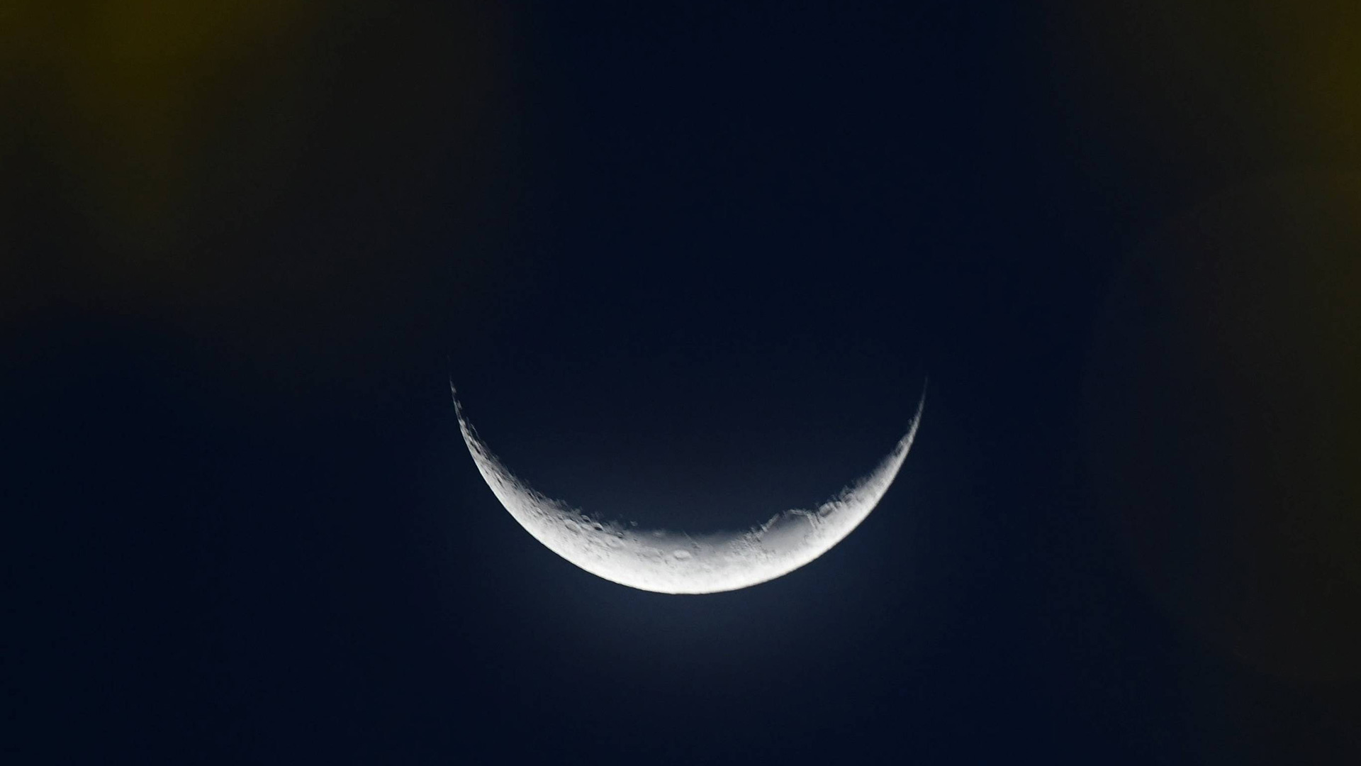 What is the rare 'smiley face' Moon and how to view it