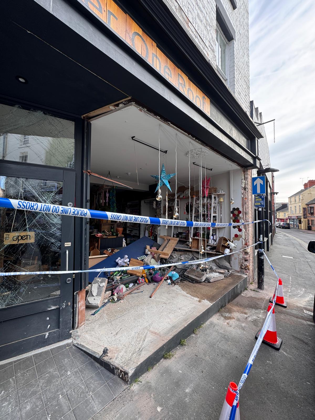 Oswestry shop owner says damage to shop front came at difficult time ...