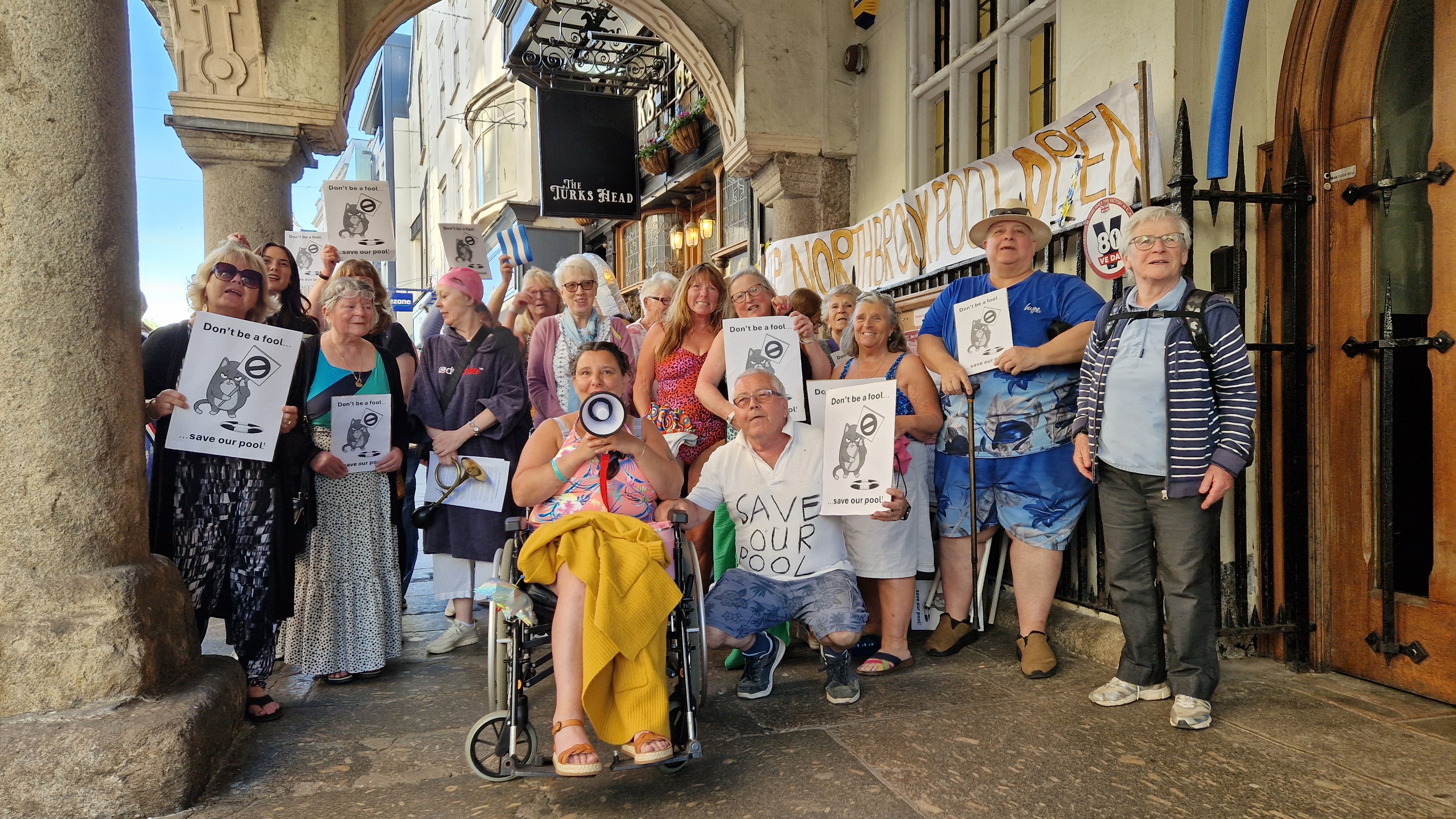 Protesters hit the streets in battle to save swimming pool